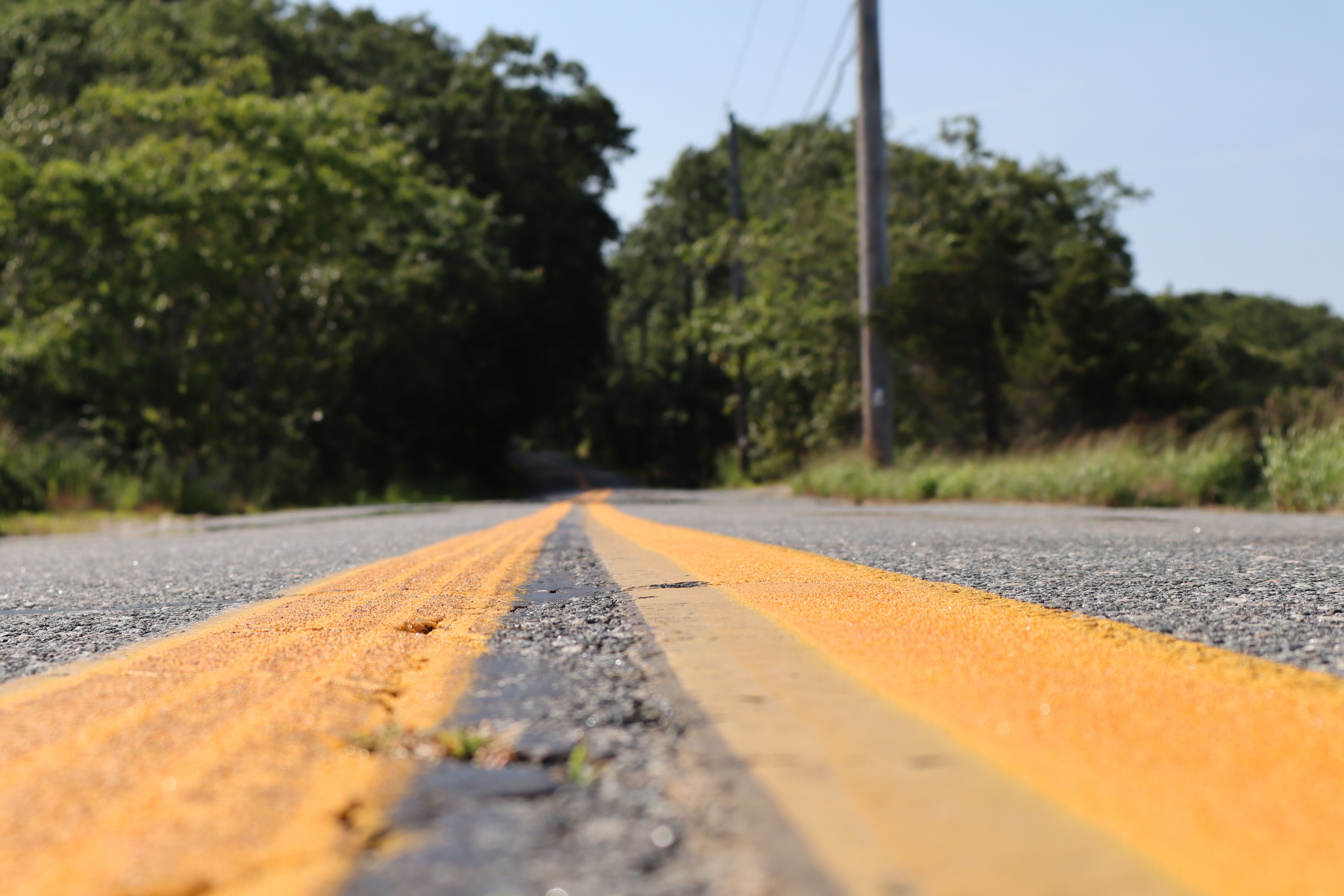 Country Road with Yellow Center Lines View · Free Stock Photo