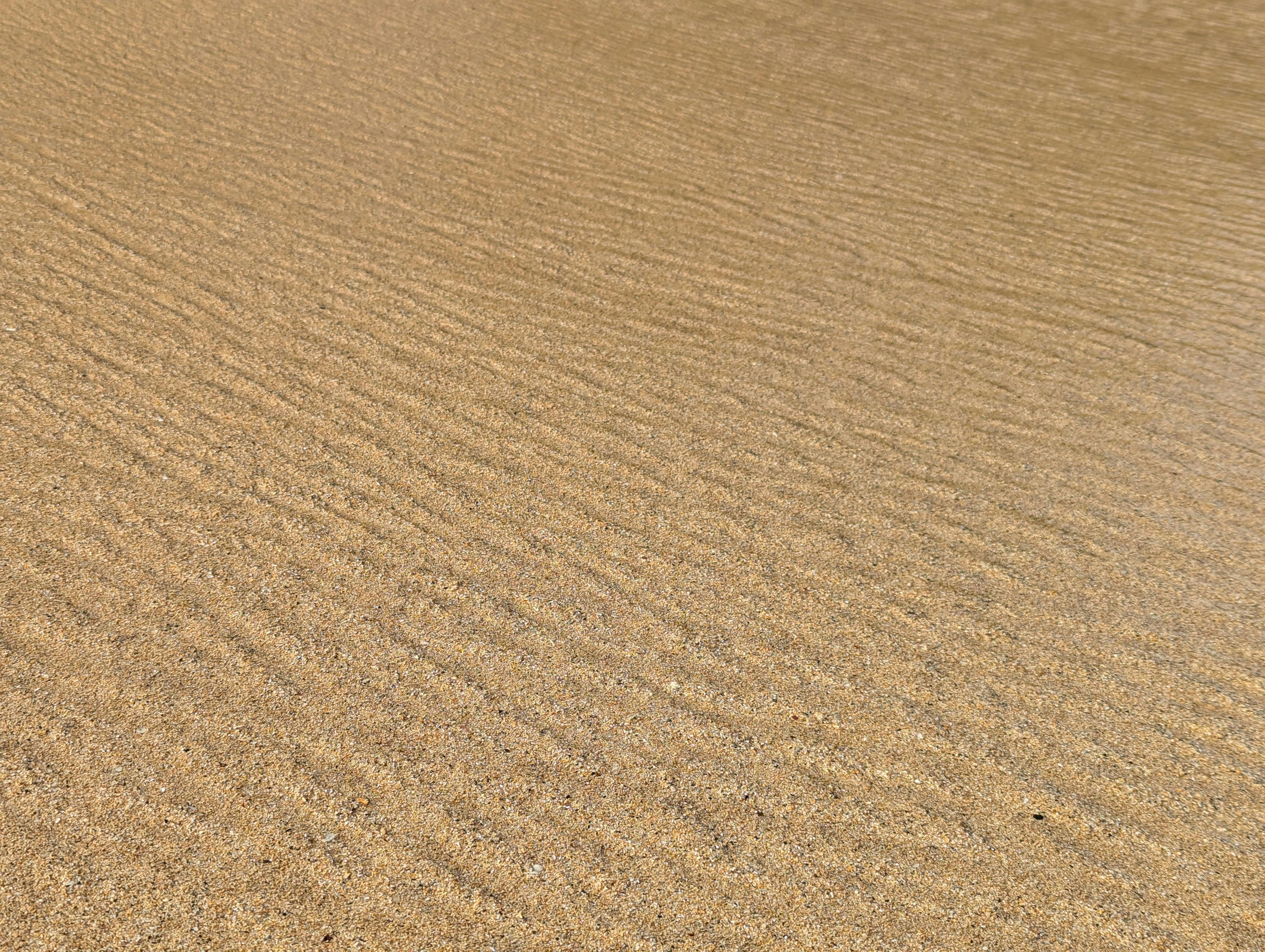 Close-Up Photo of White Sand · Free Stock Photo