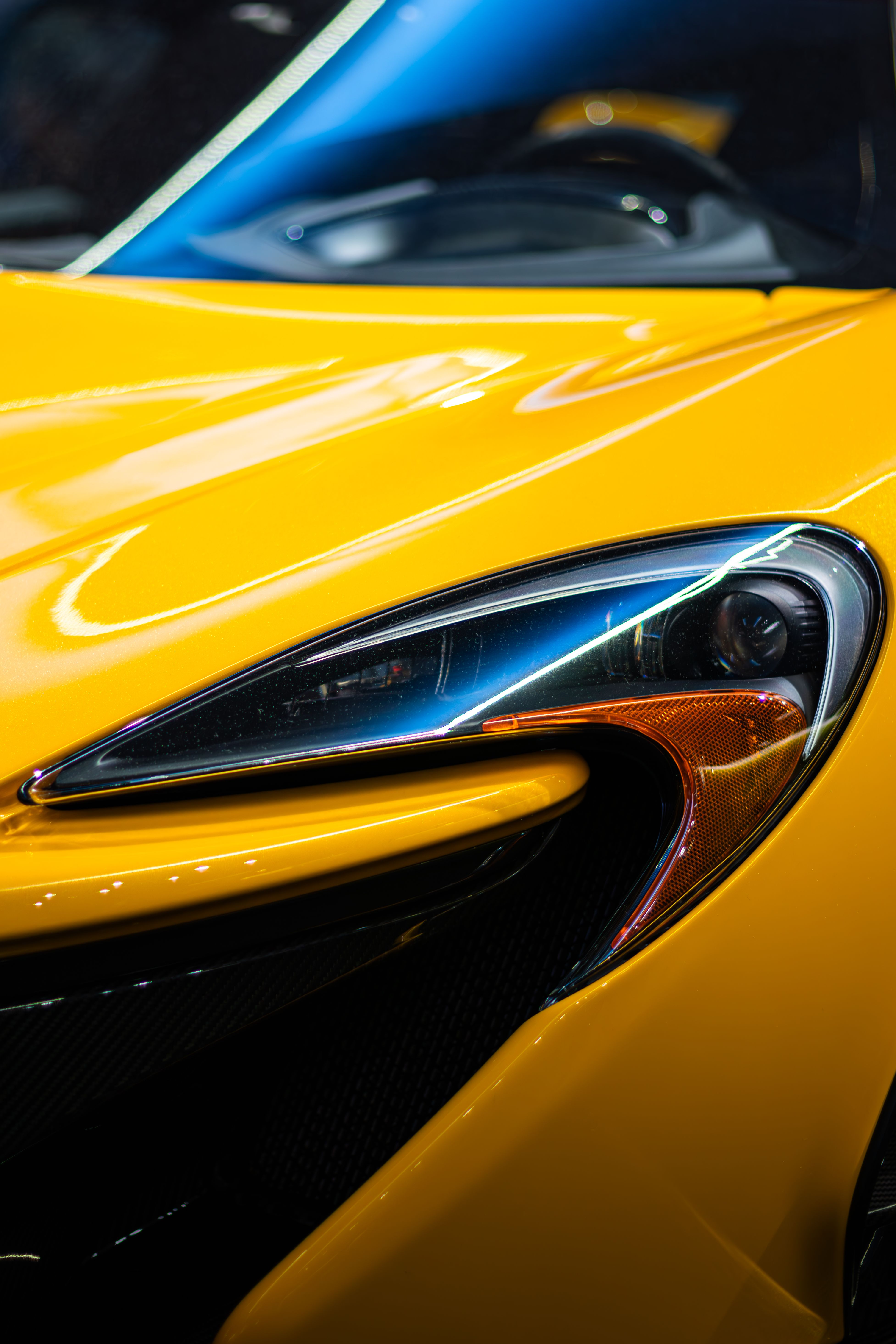 Close-Up of Vibrant Yellow Luxury Sports Car · Free Stock Photo