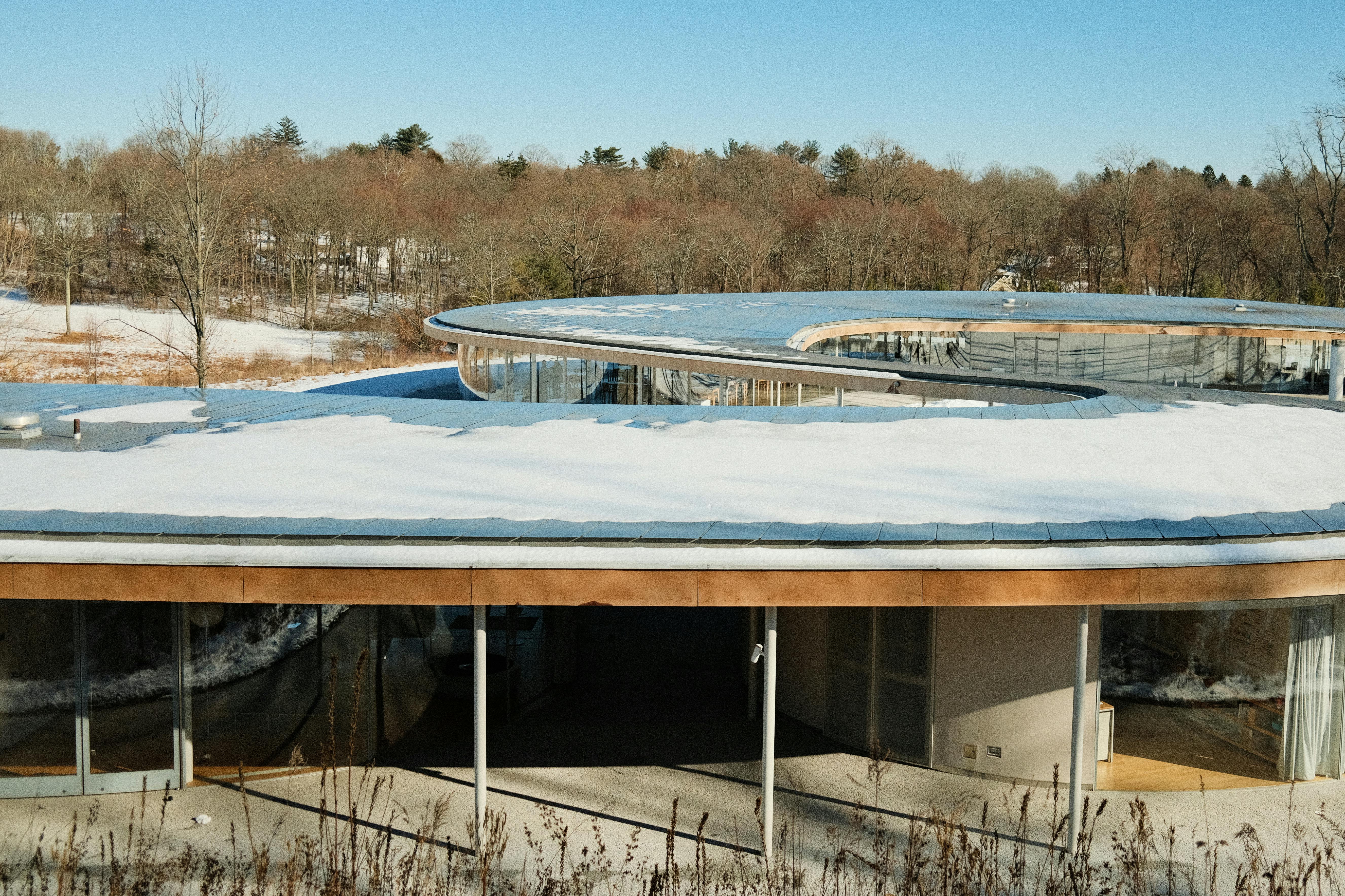 Modern Snow-Covered Architectural Building in Winter · Free Stock Photo