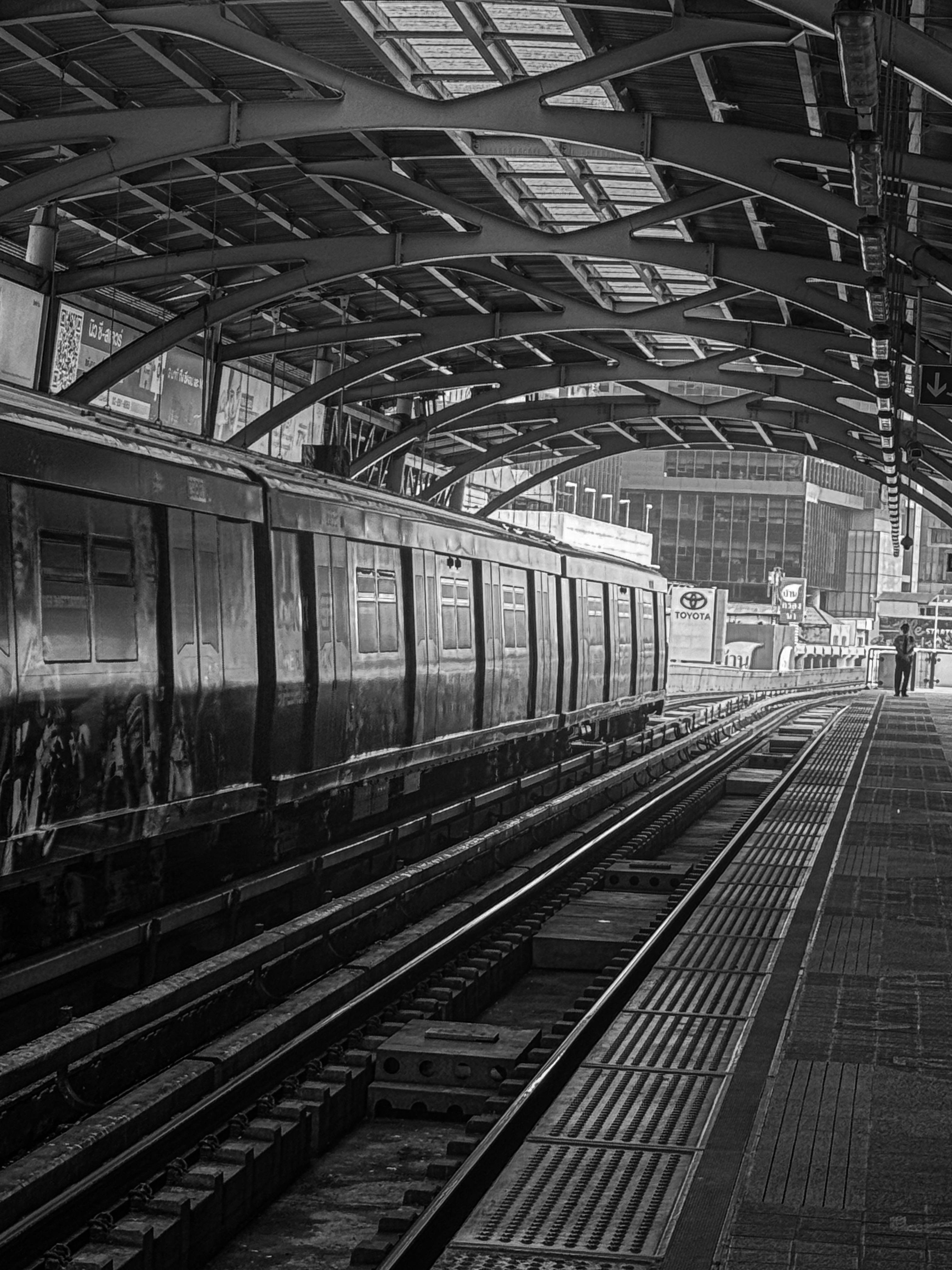 Black and White Bangkok Skytrain Station Scene · Free Stock Photo