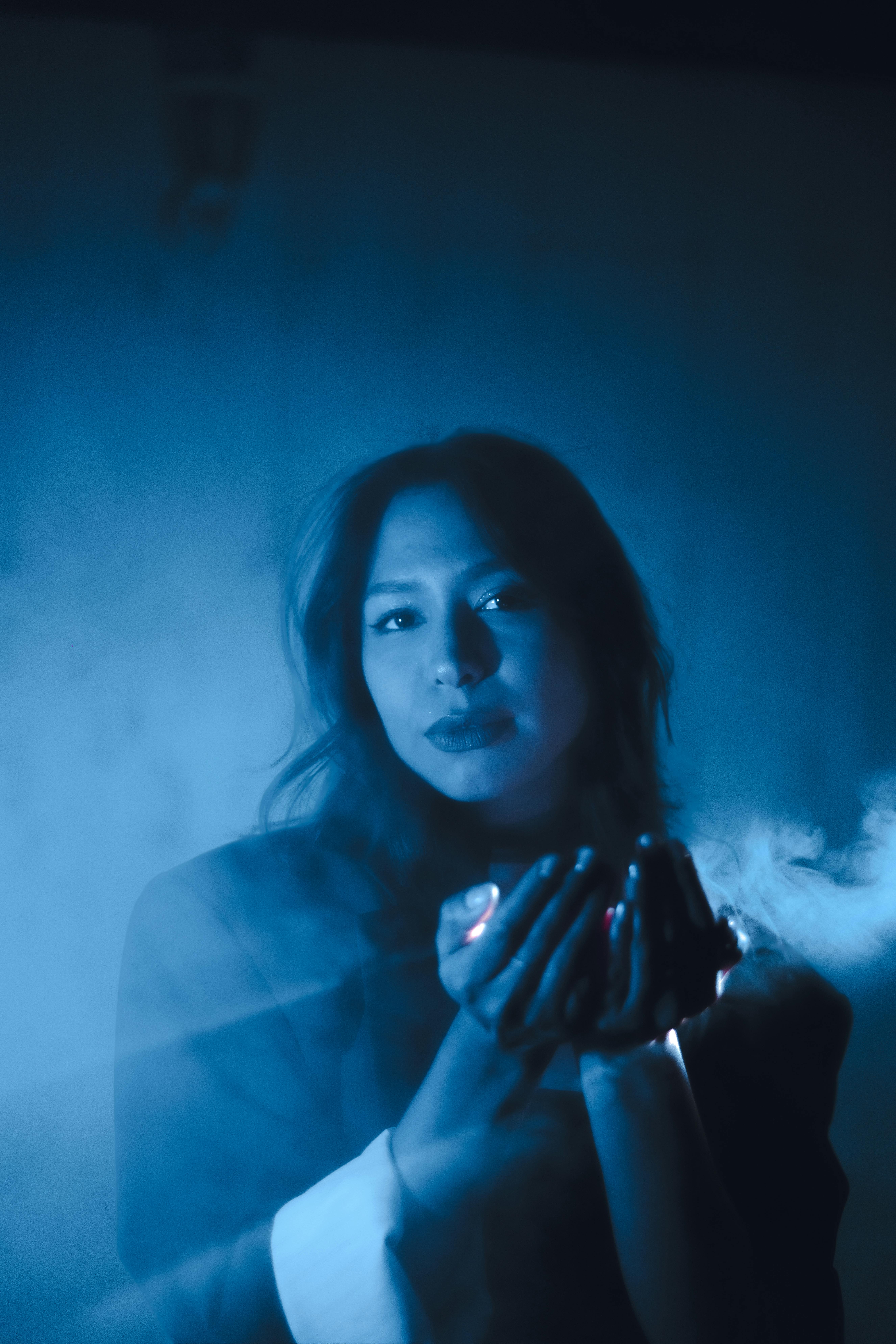 Moody Portrait of Woman in Blue Light · Free Stock Photo