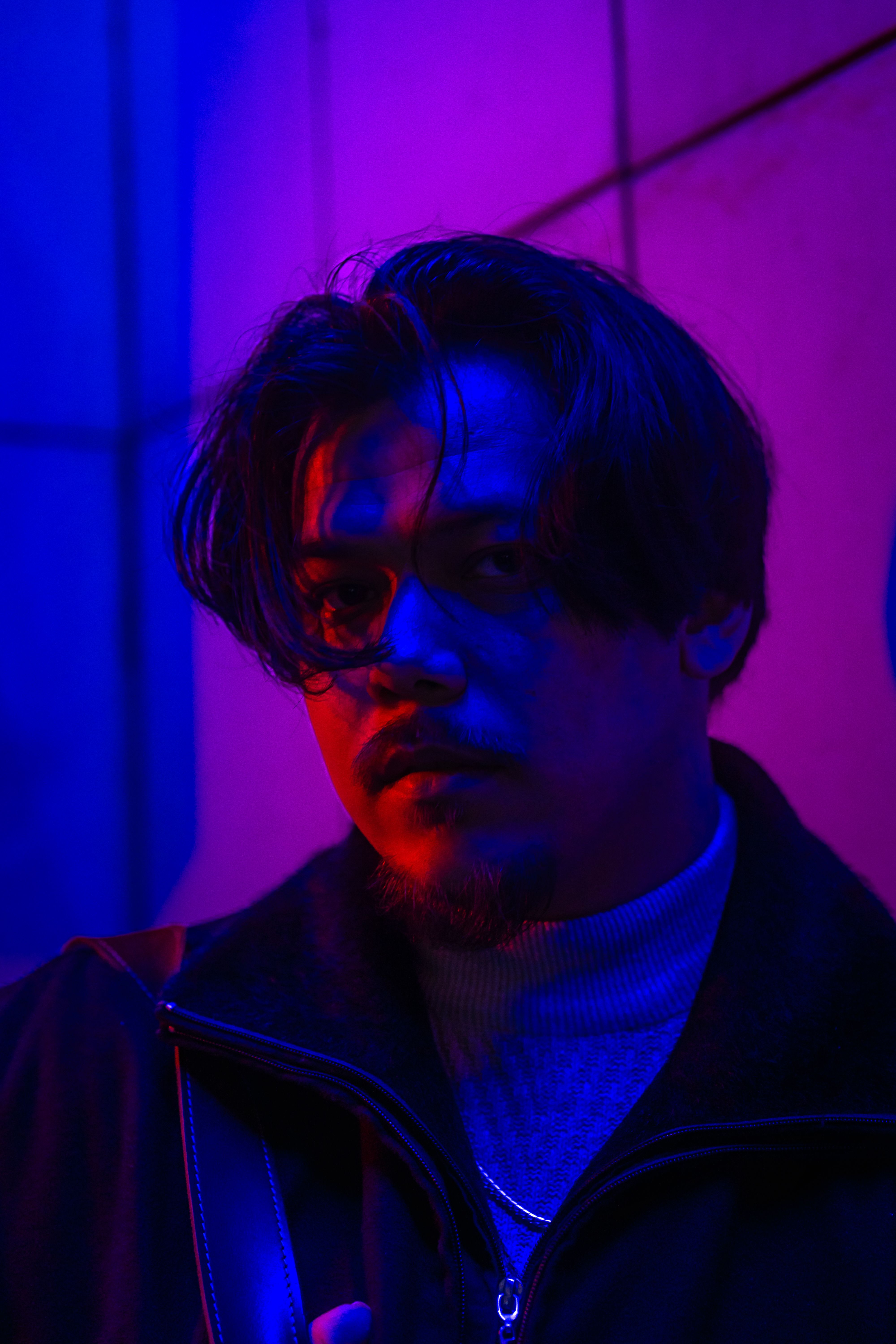 Moody Portrait with Dramatic Neon Lighting · Free Stock Photo