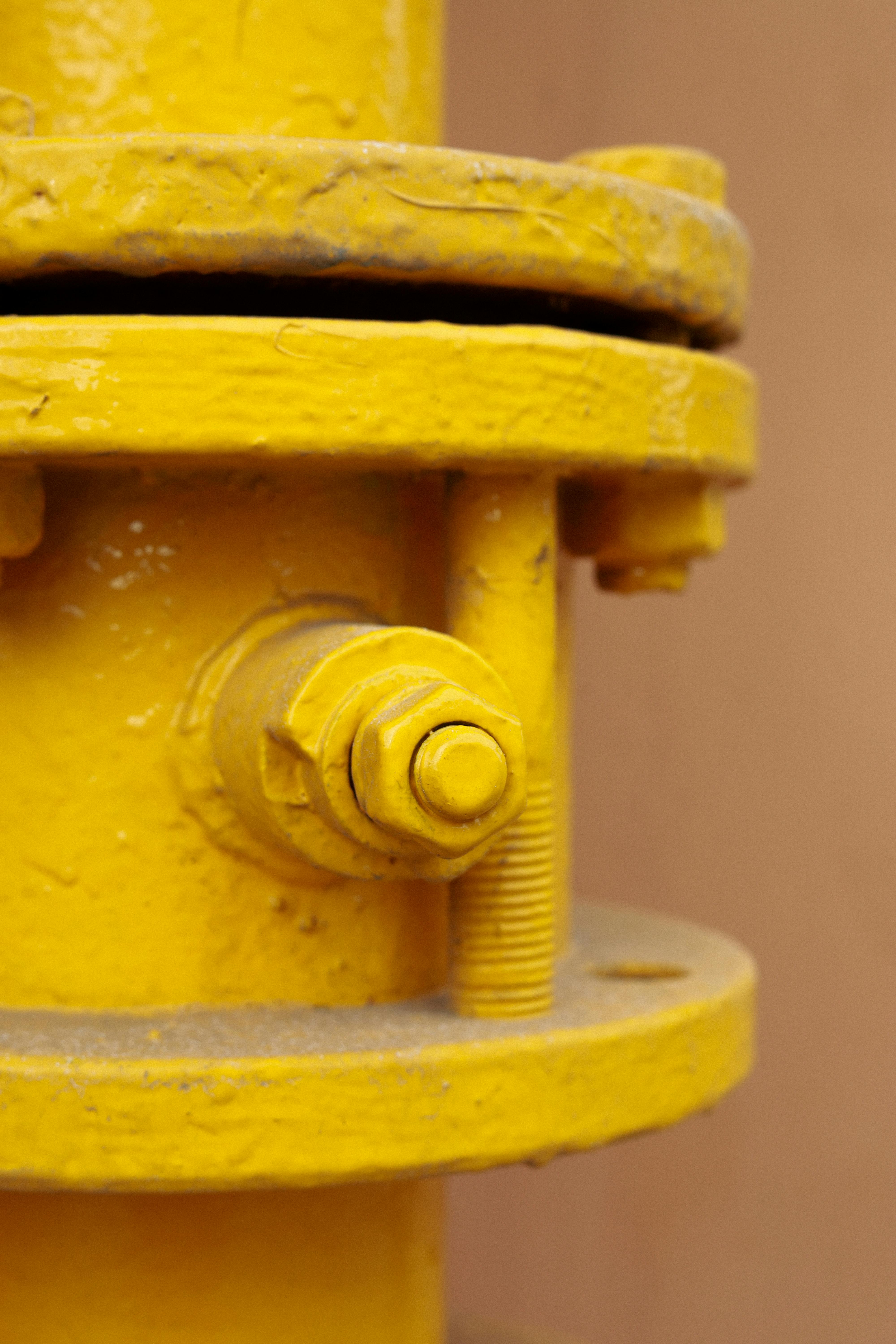 Close-up of Industrial Yellow Pipe Joint · Free Stock Photo