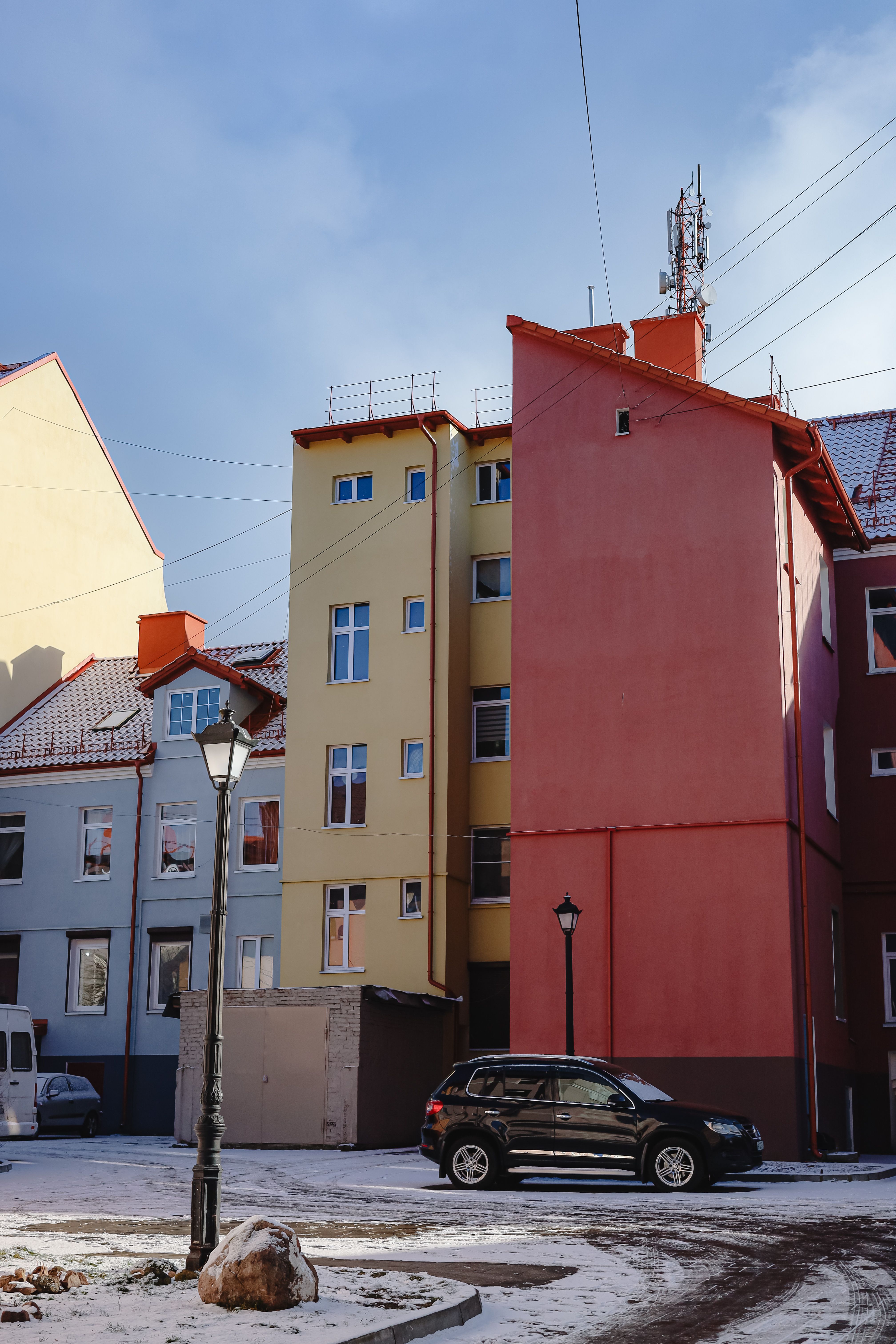 Colorful Urban Apartment Buildings in Winter · Free Stock Photo