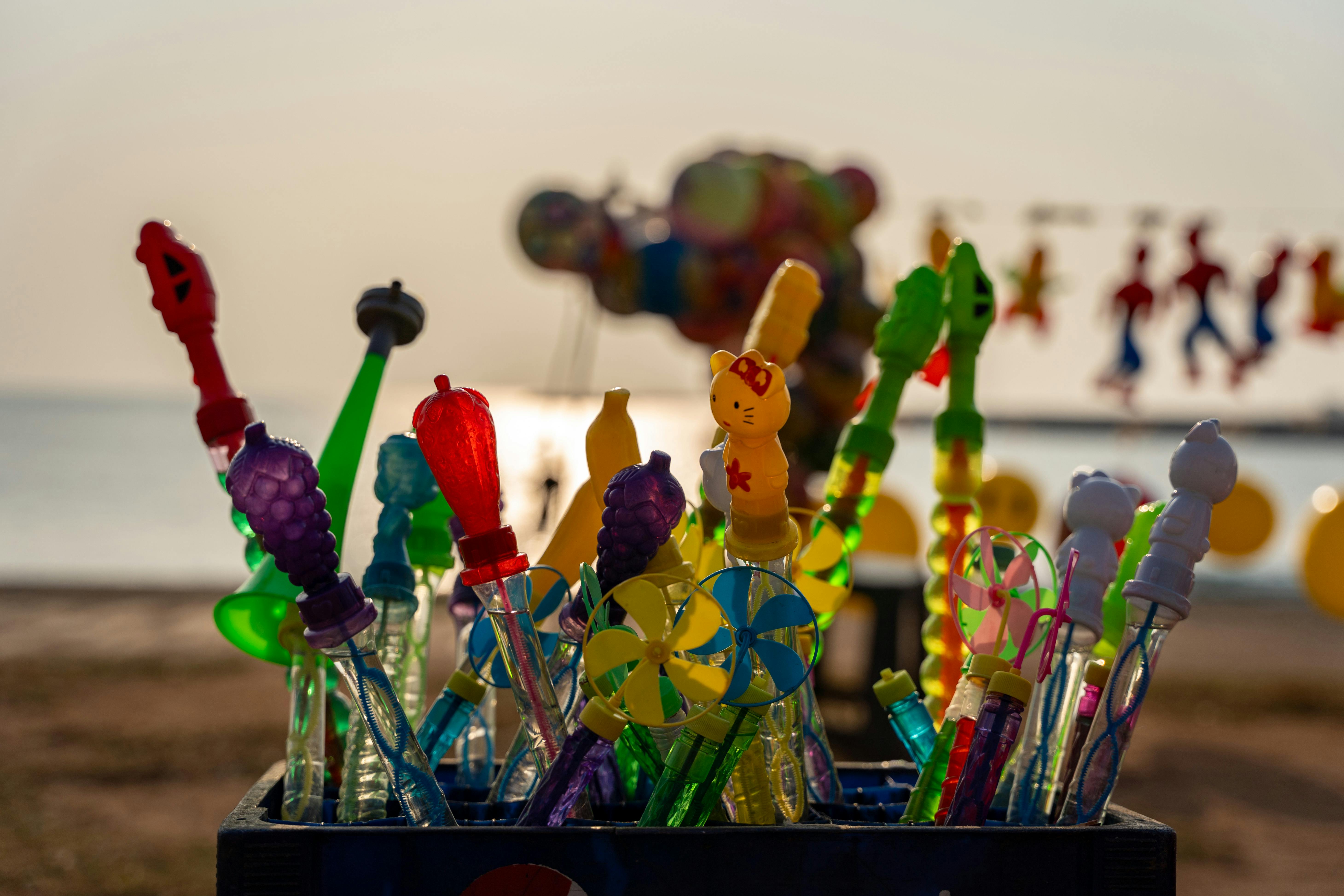 Colorful Toy Display at Sunset on Colombo Beach · Free Stock Photo