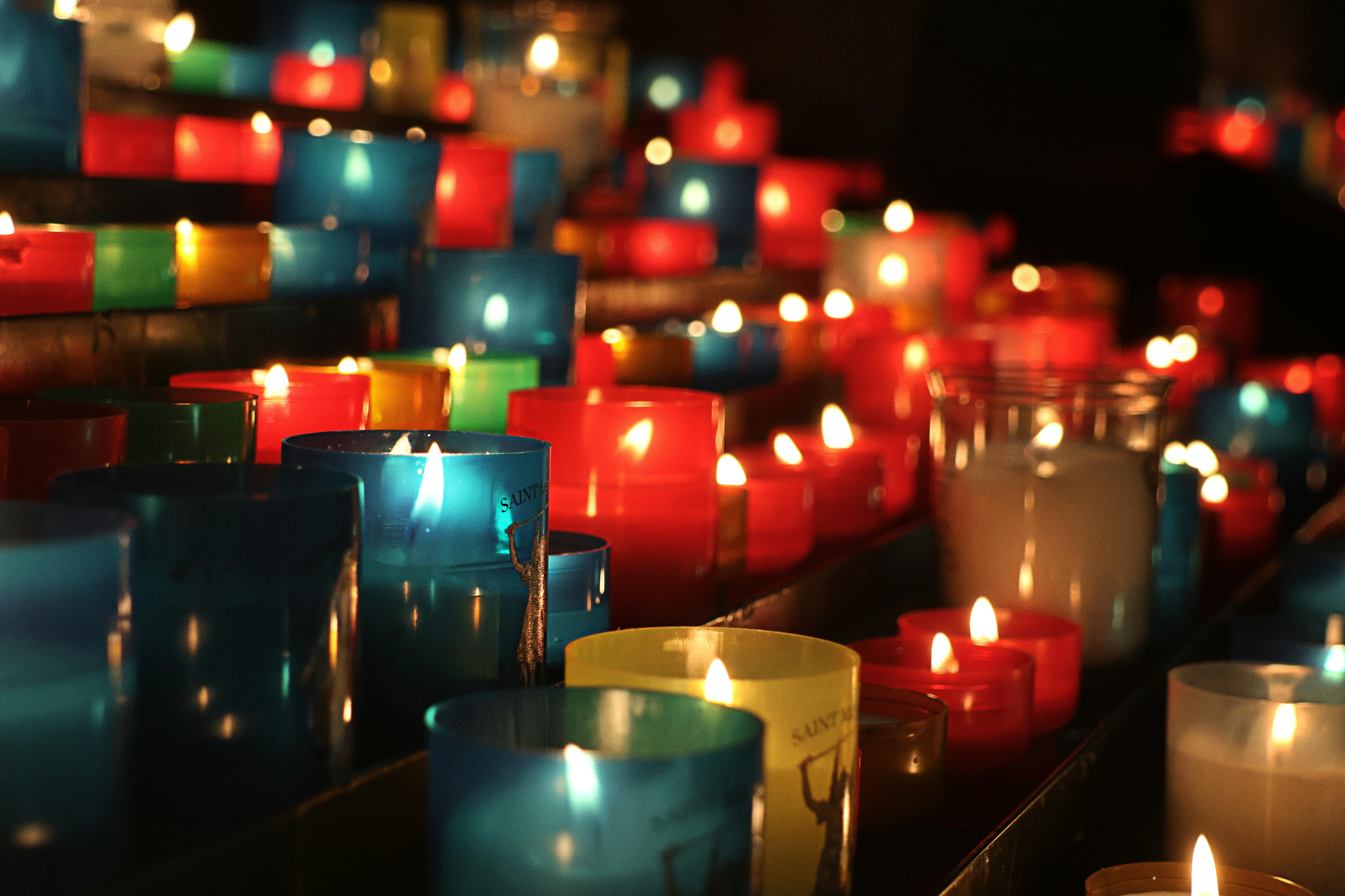 Colorful Candlelit Votive Display at Mont-Saint-Michel · Free Stock Photo