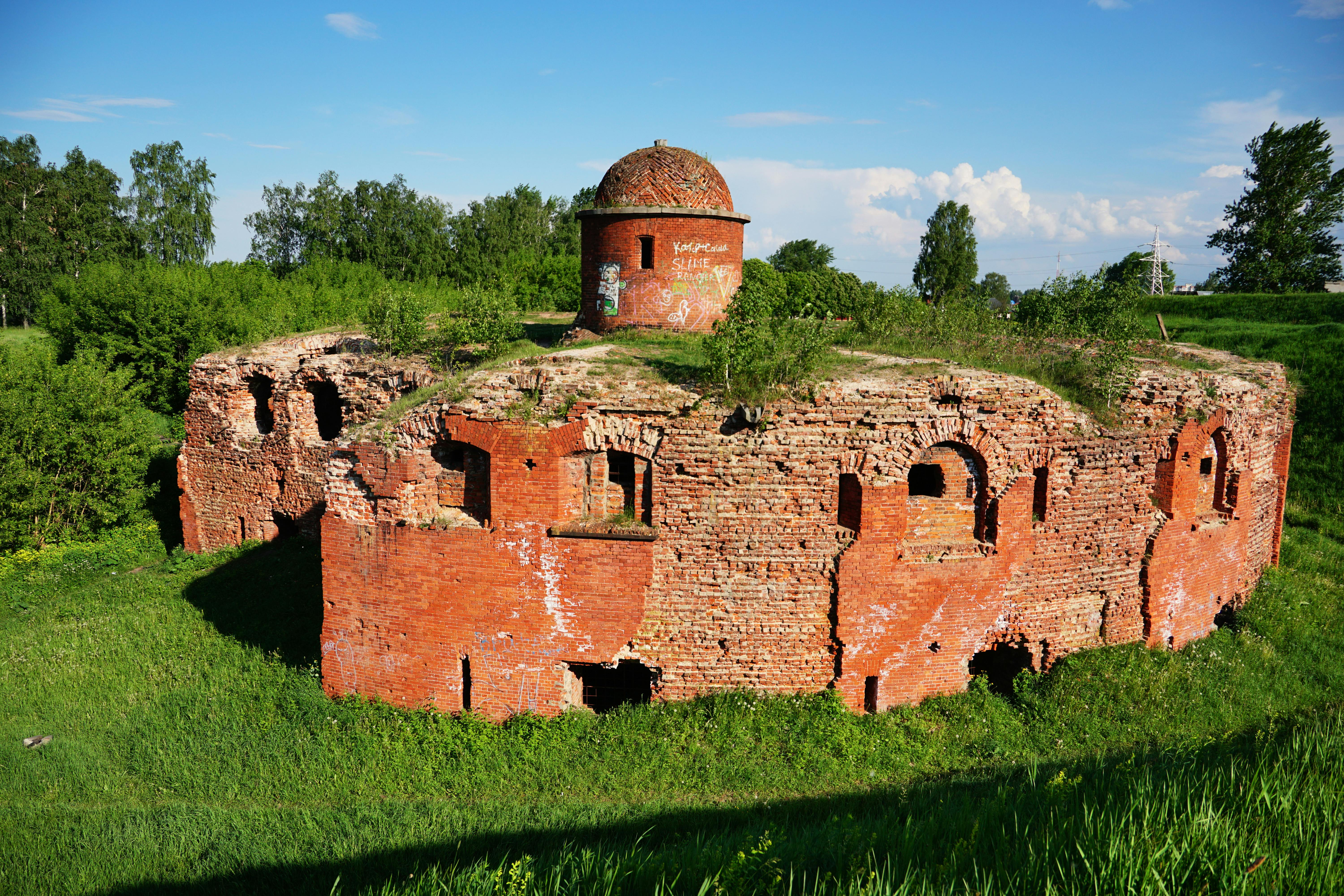 Ancient Red Brick Ruins Amidst Greenery · Free Stock Photo