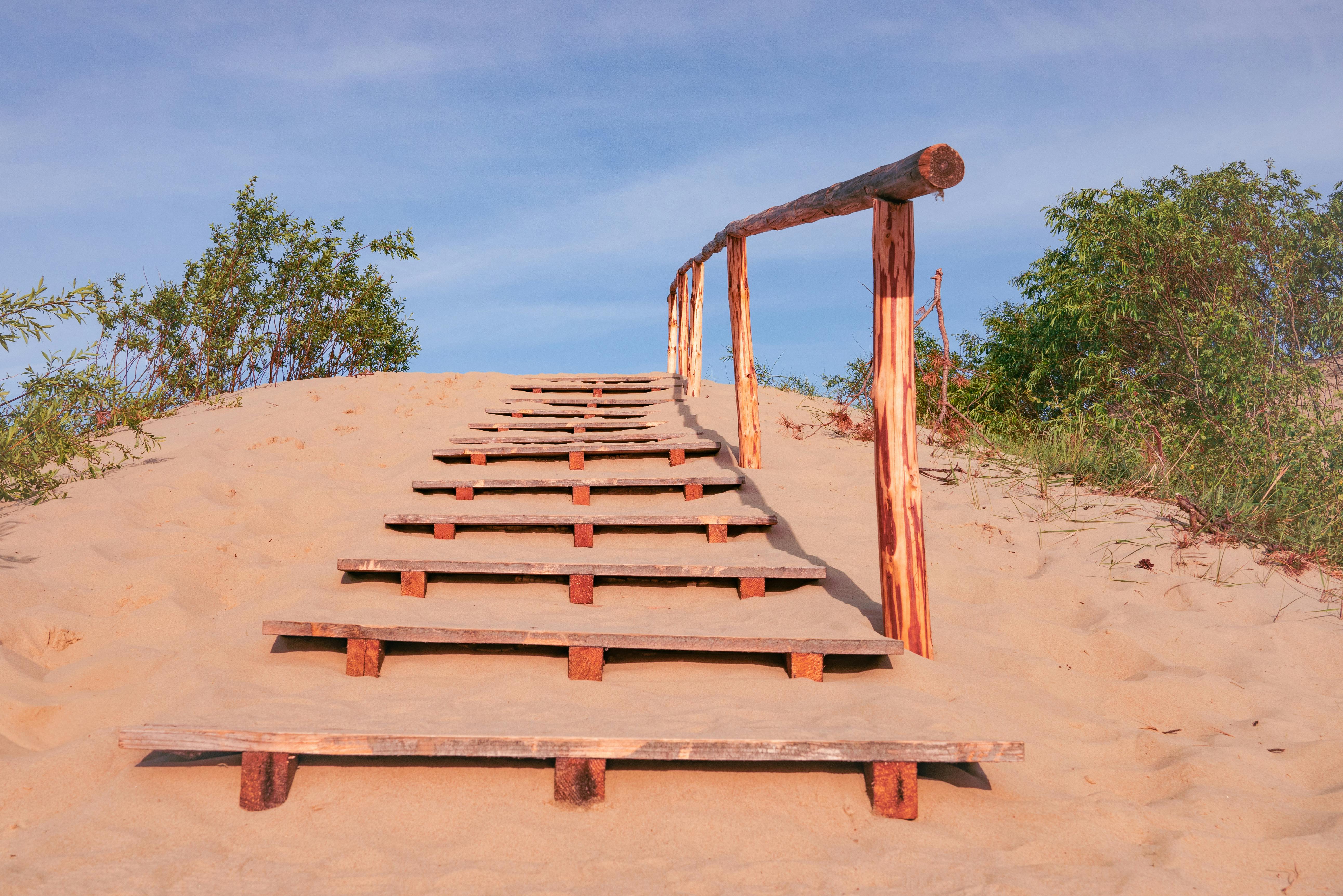 Rustic Wooden Stairs on a Sandy Beach Pathway · Free Stock Photo