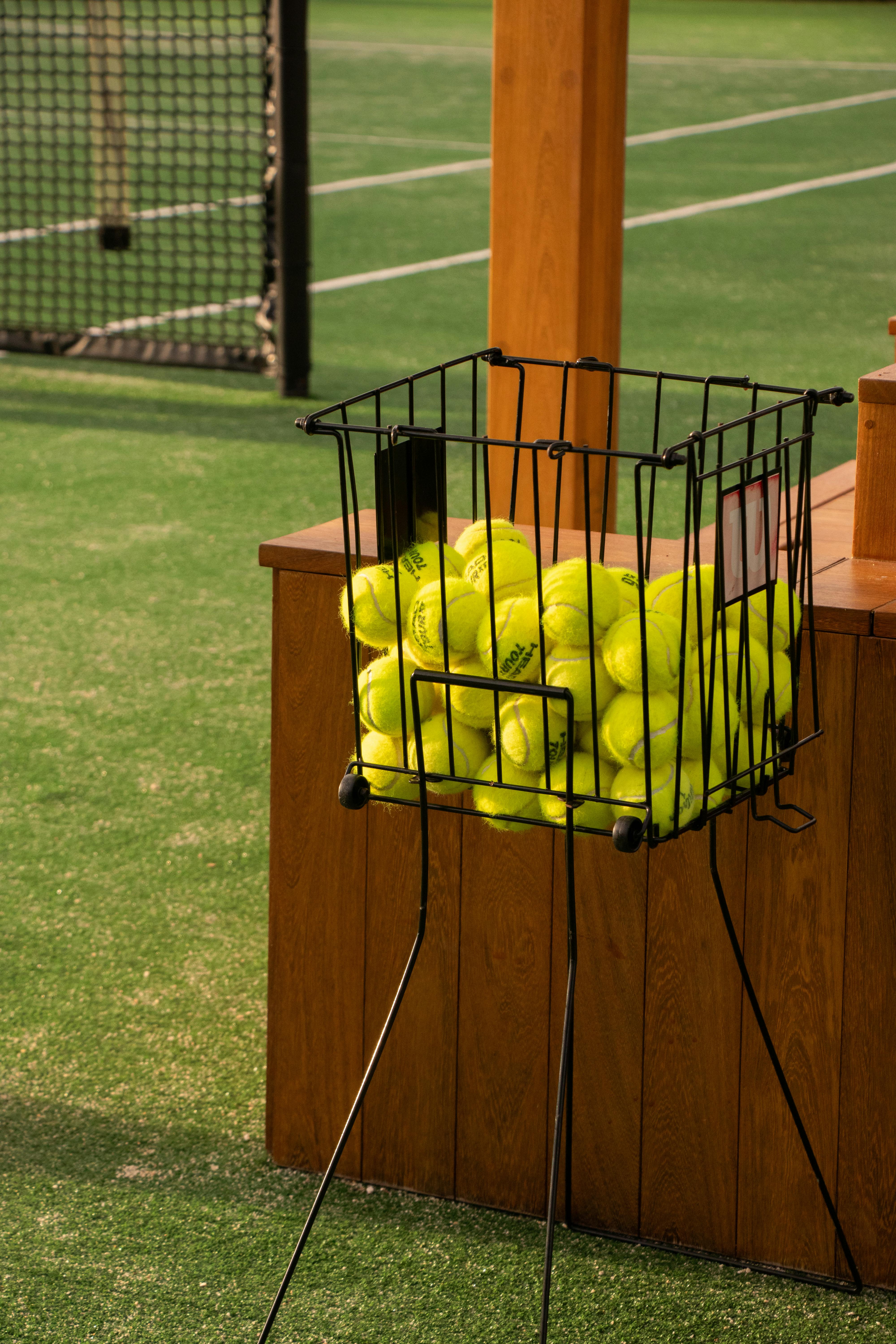 Tennis Ball Basket on Outdoor Tennis Court · Free Stock Photo