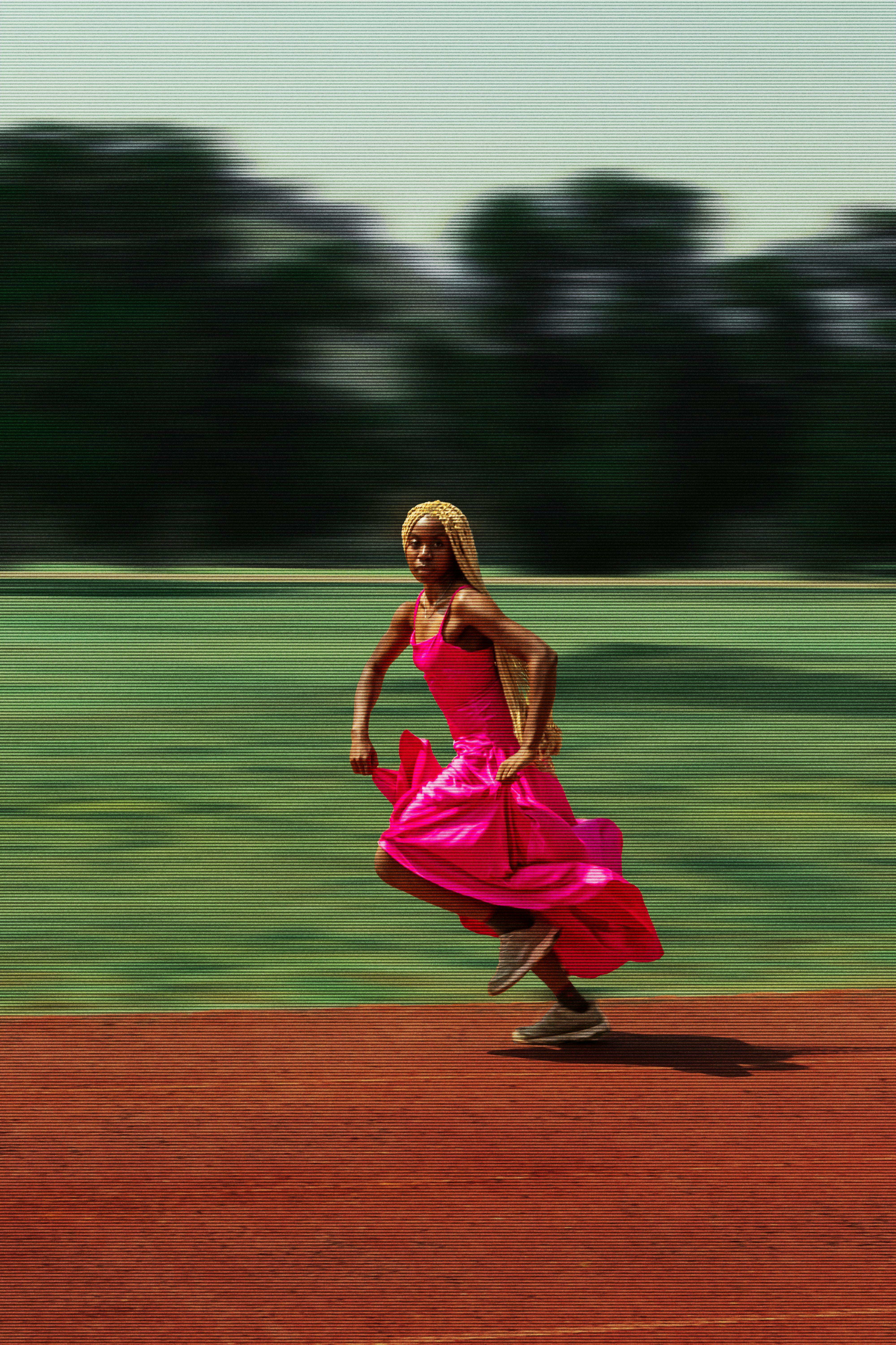 Woman in Pink Dress Running on Track Outdoors · Free Stock Photo