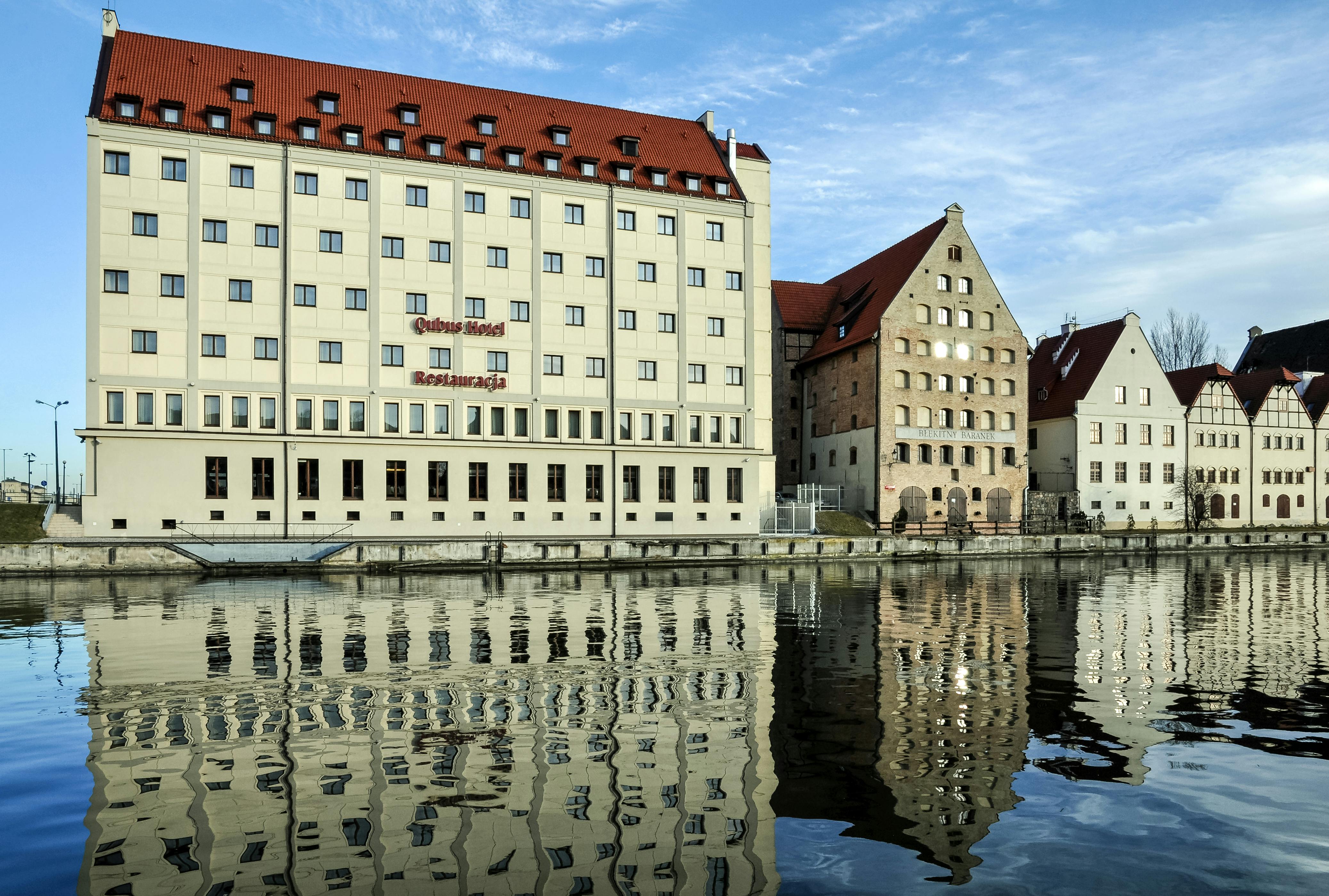 Charming Reflection of Danzig's Historic Architecture · Free Stock Photo
