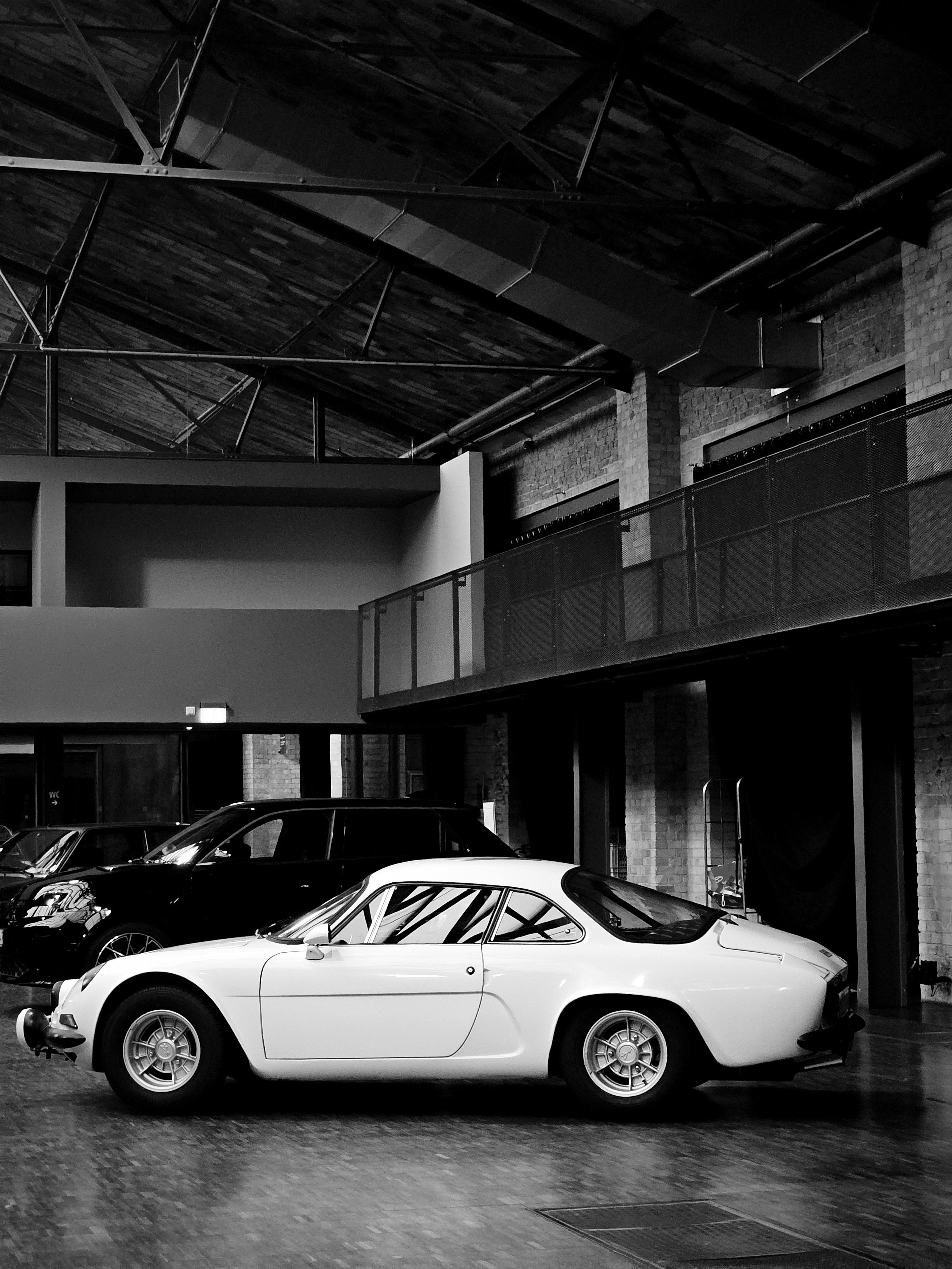 Classic Retro Cars in Berlin Loft Setting · Free Stock Photo