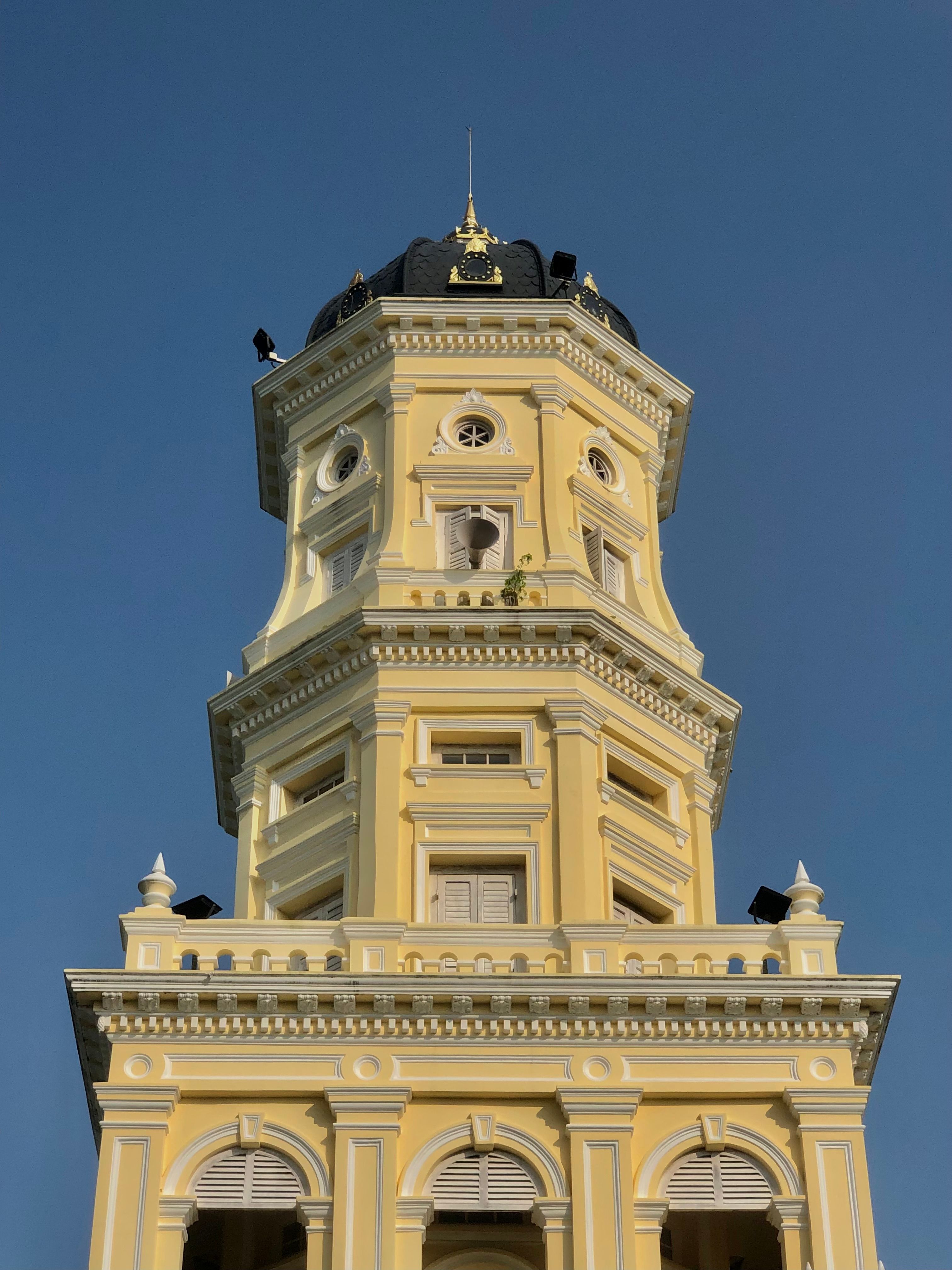 Vintage Clock Tower Against Blue Sky · Free Stock Photo