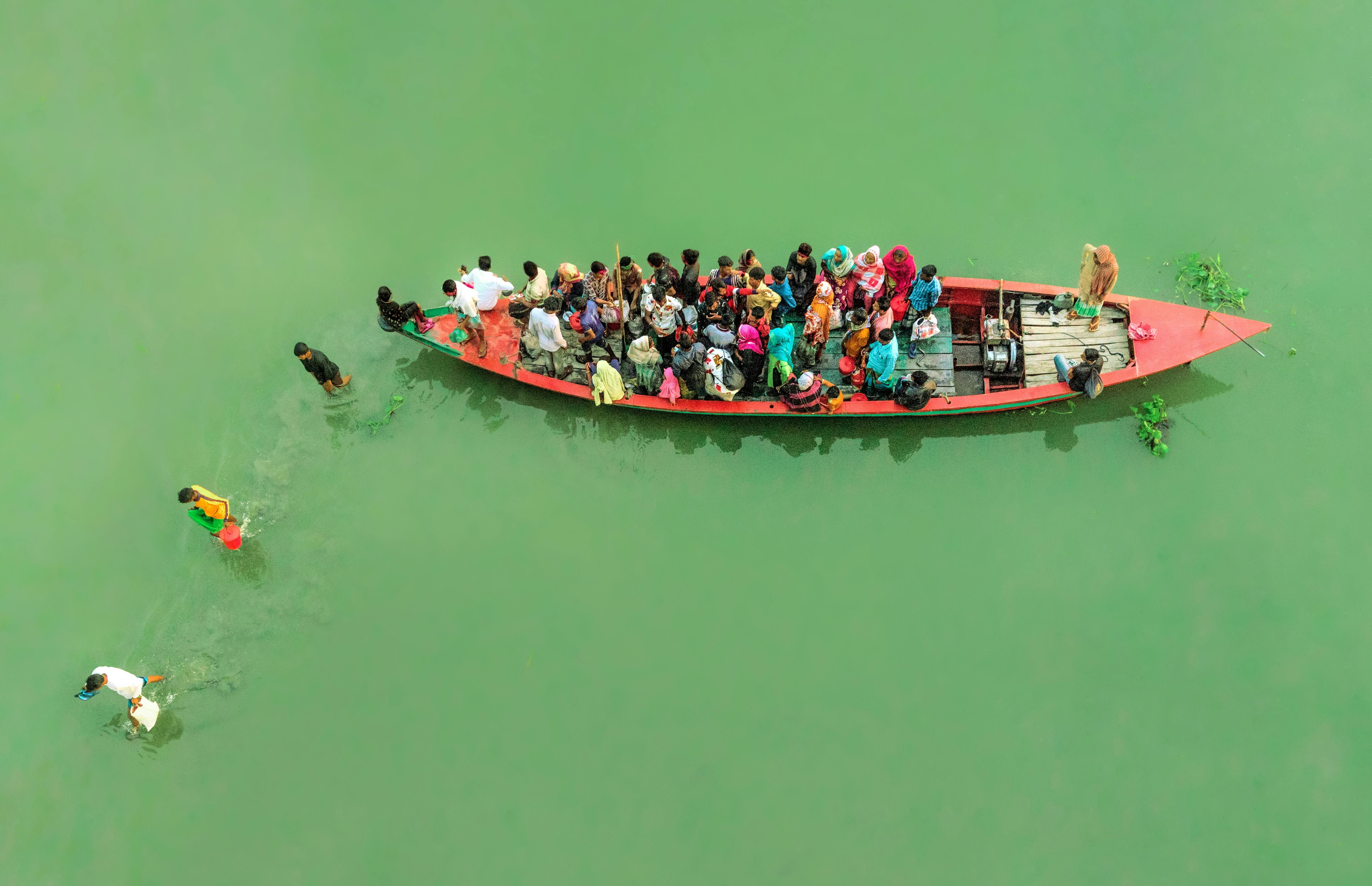 Aerial View of a Crowded Boat on Green Waters in Bangladesh · Free ...