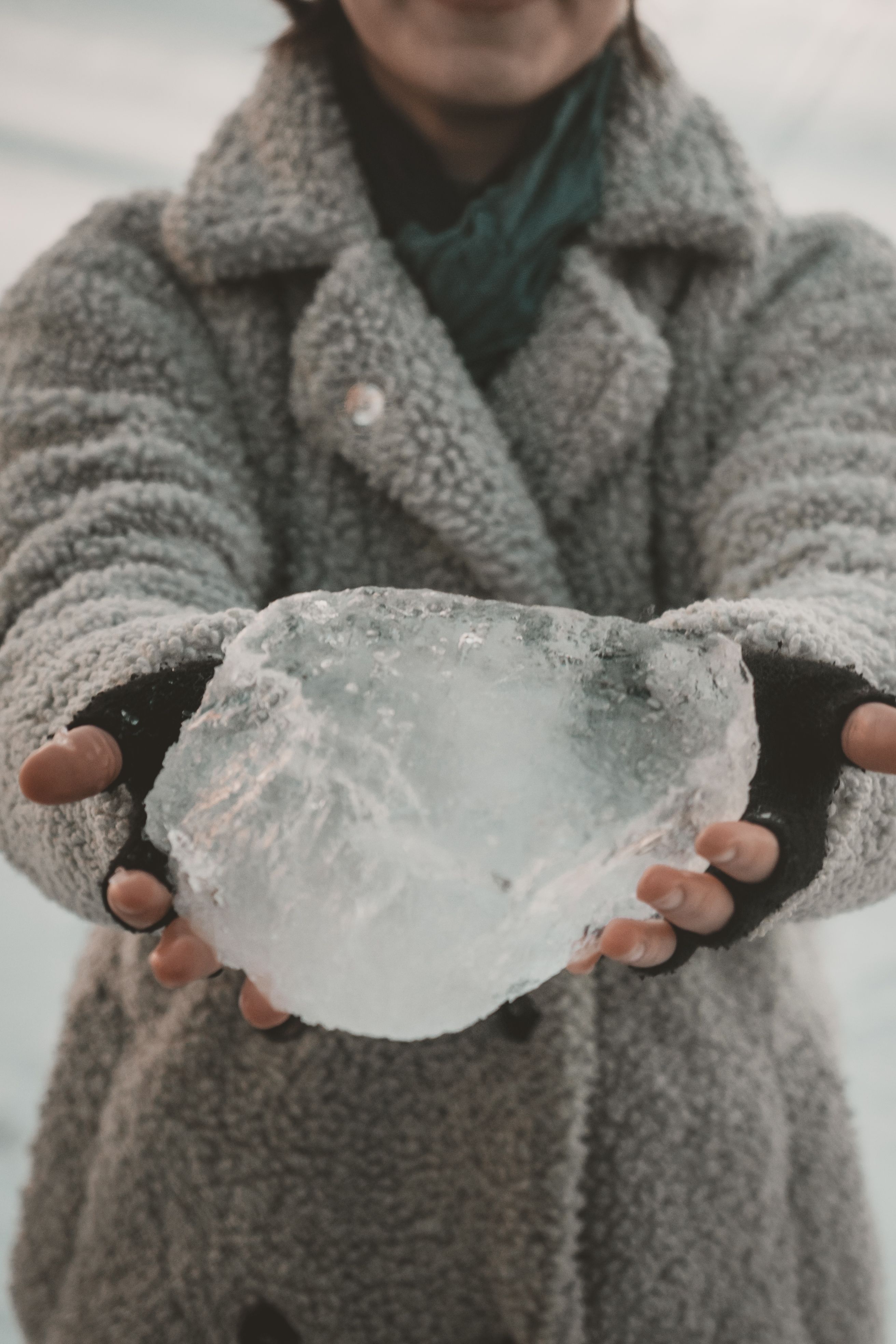 Person Holding Chunk of Ice in Winter · Free Stock Photo