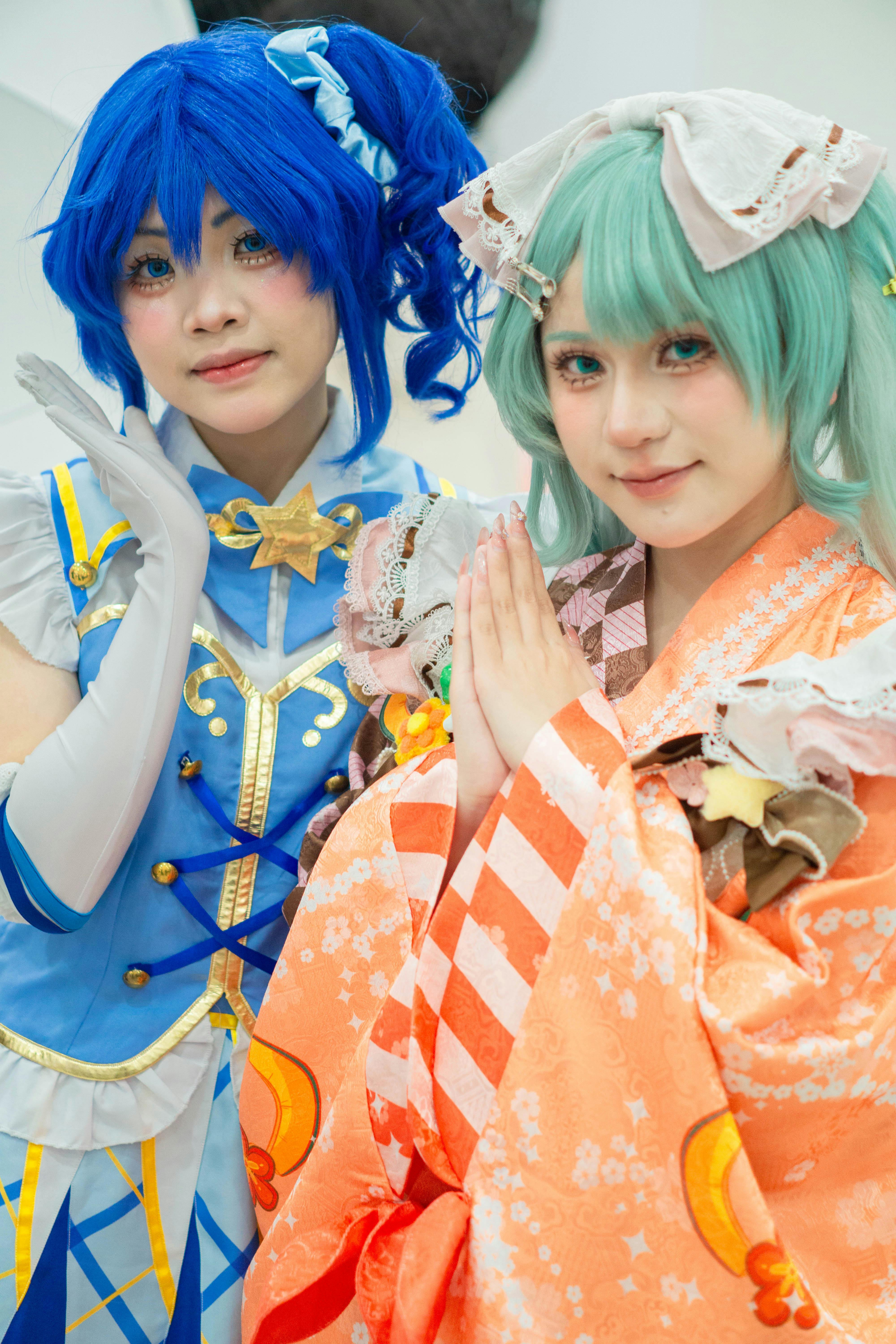 Colorful Cosplay Costumes with Vibrant Designs · Free Stock Photo