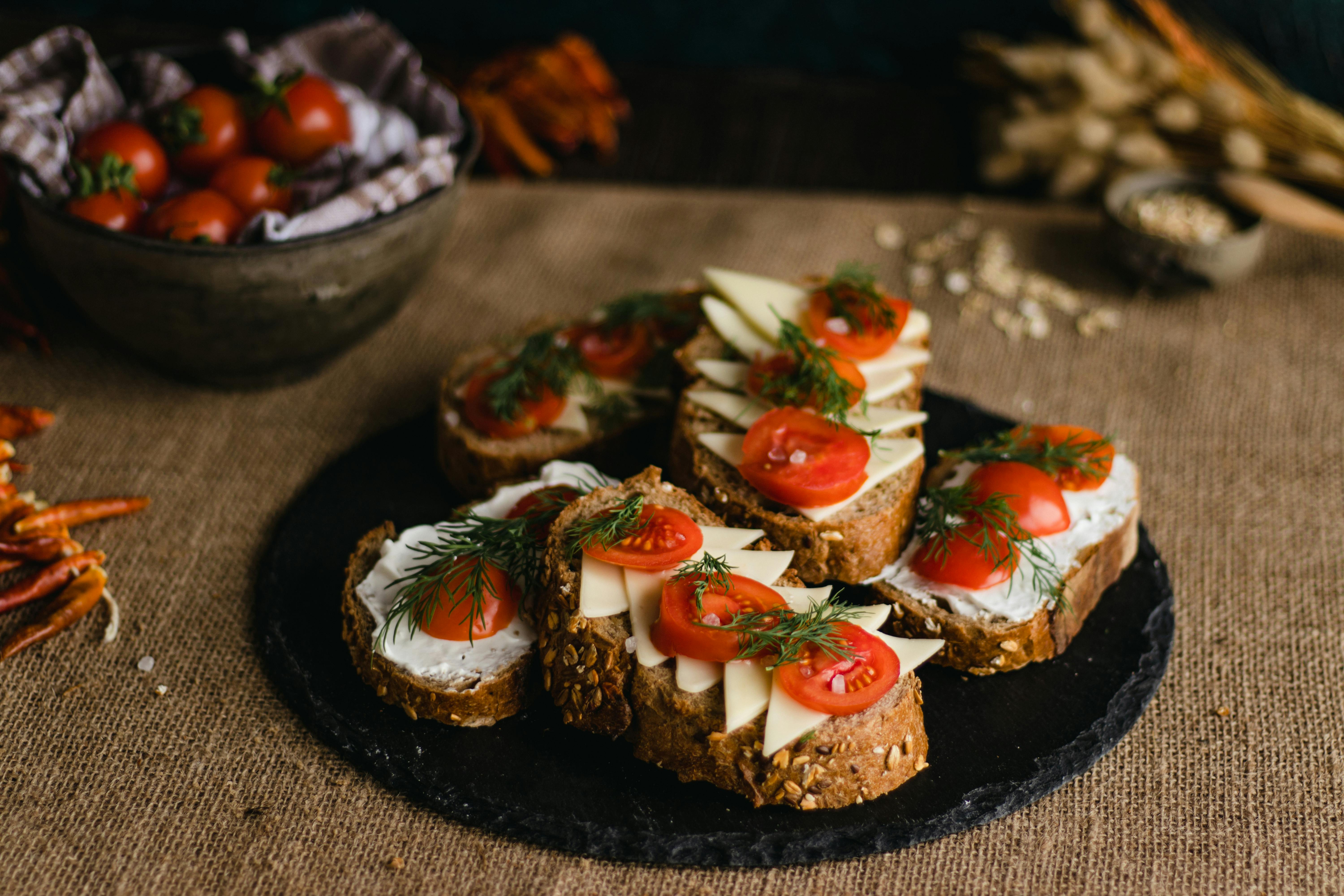 Rustic Multigrain Bread Slices with Tomato and Cheese · Free Stock Photo