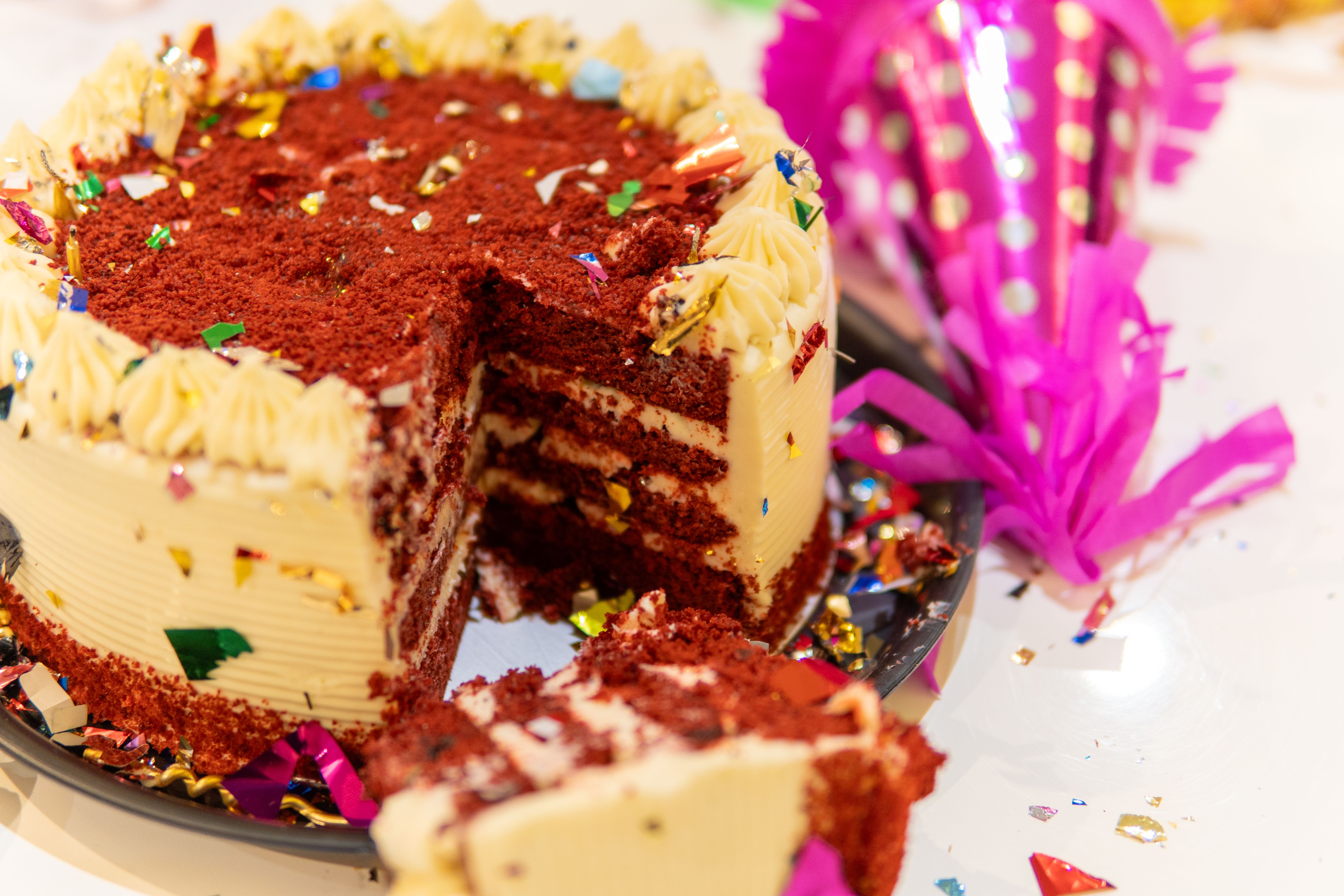 Festive Red Velvet Cake at a Celebration · Free Stock Photo