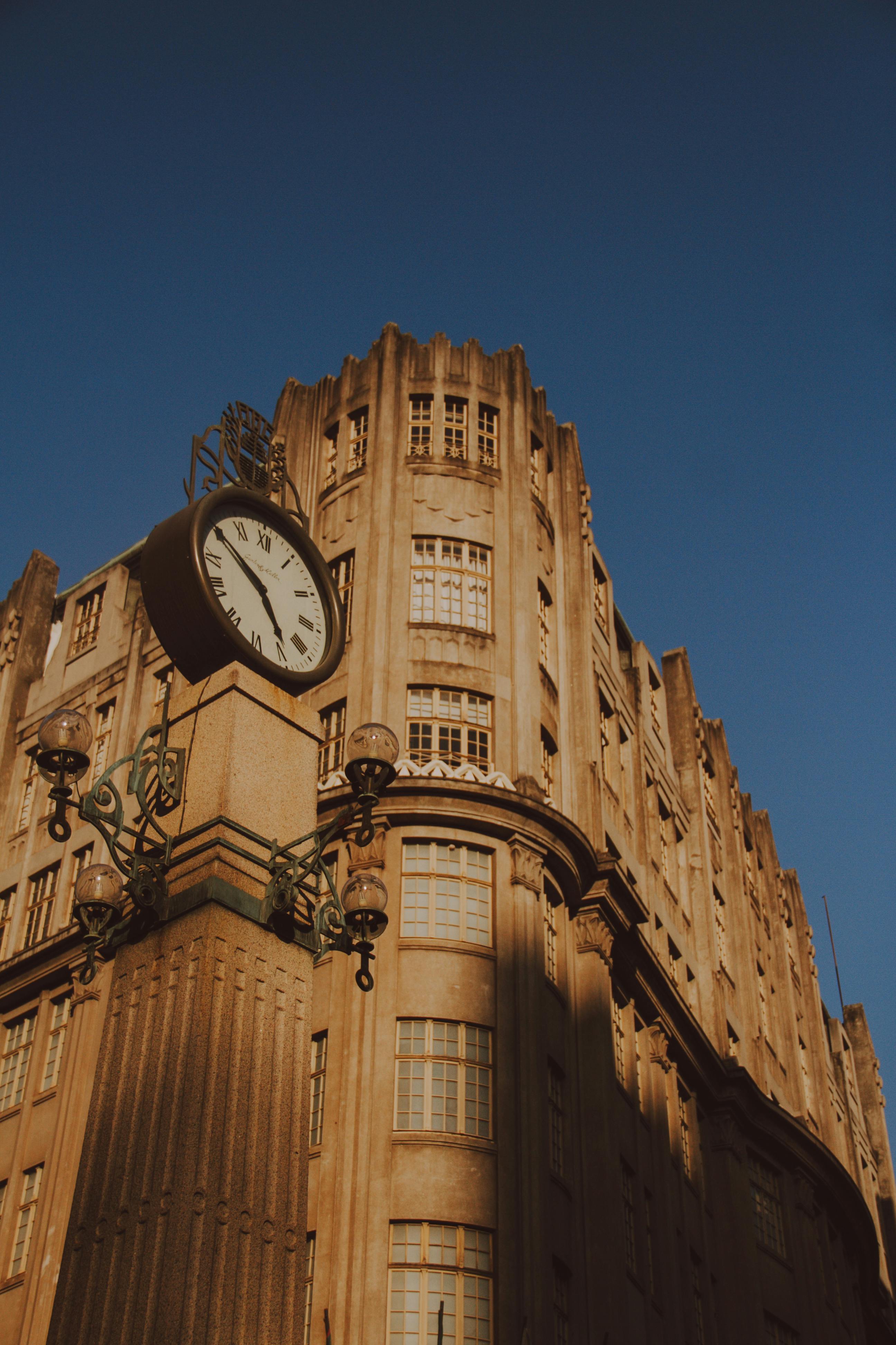 Grand Clock Tower with Vintage Architectural Design · Free Stock Photo