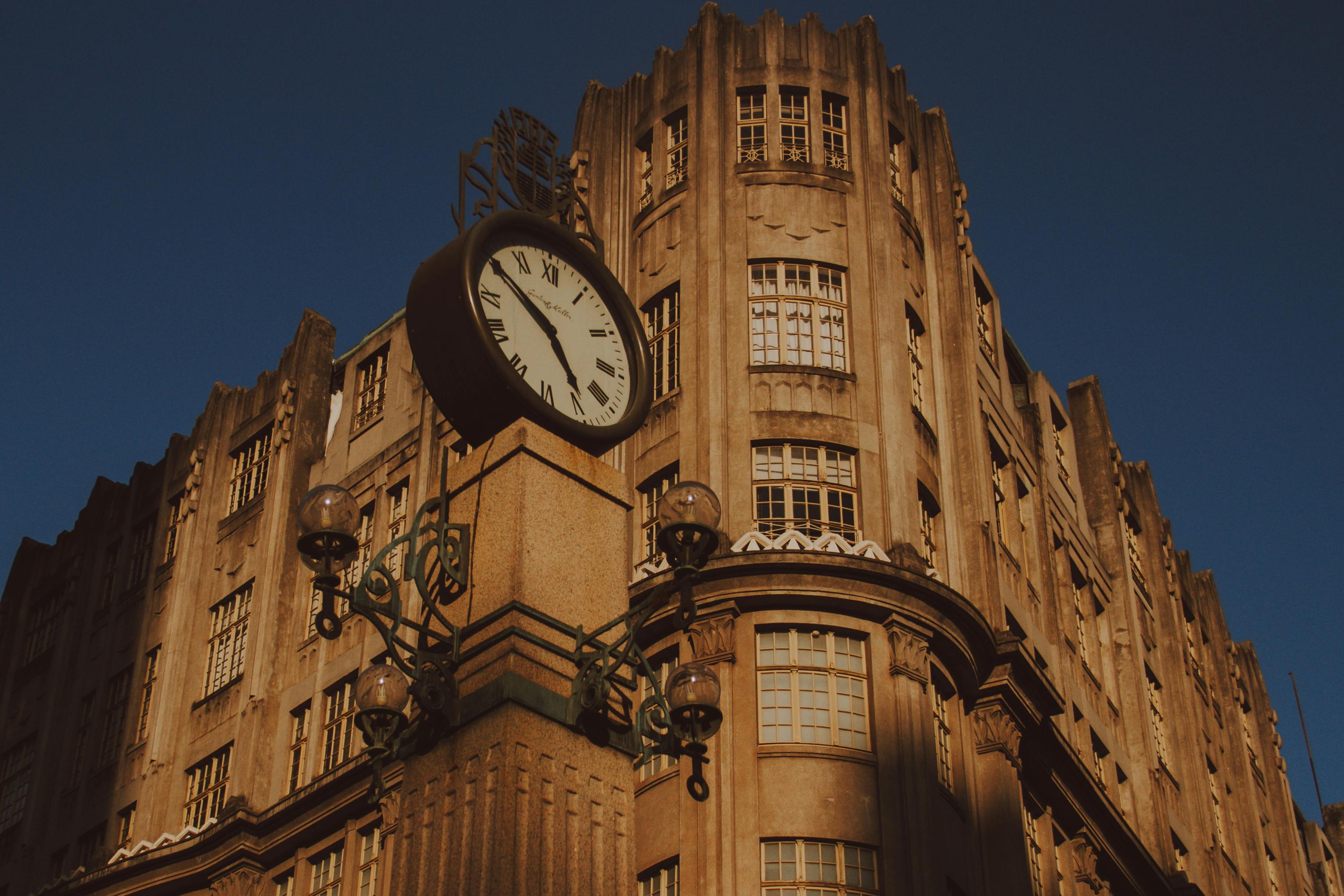 Vintage Urban Clock Tower in Cityscape · Free Stock Photo