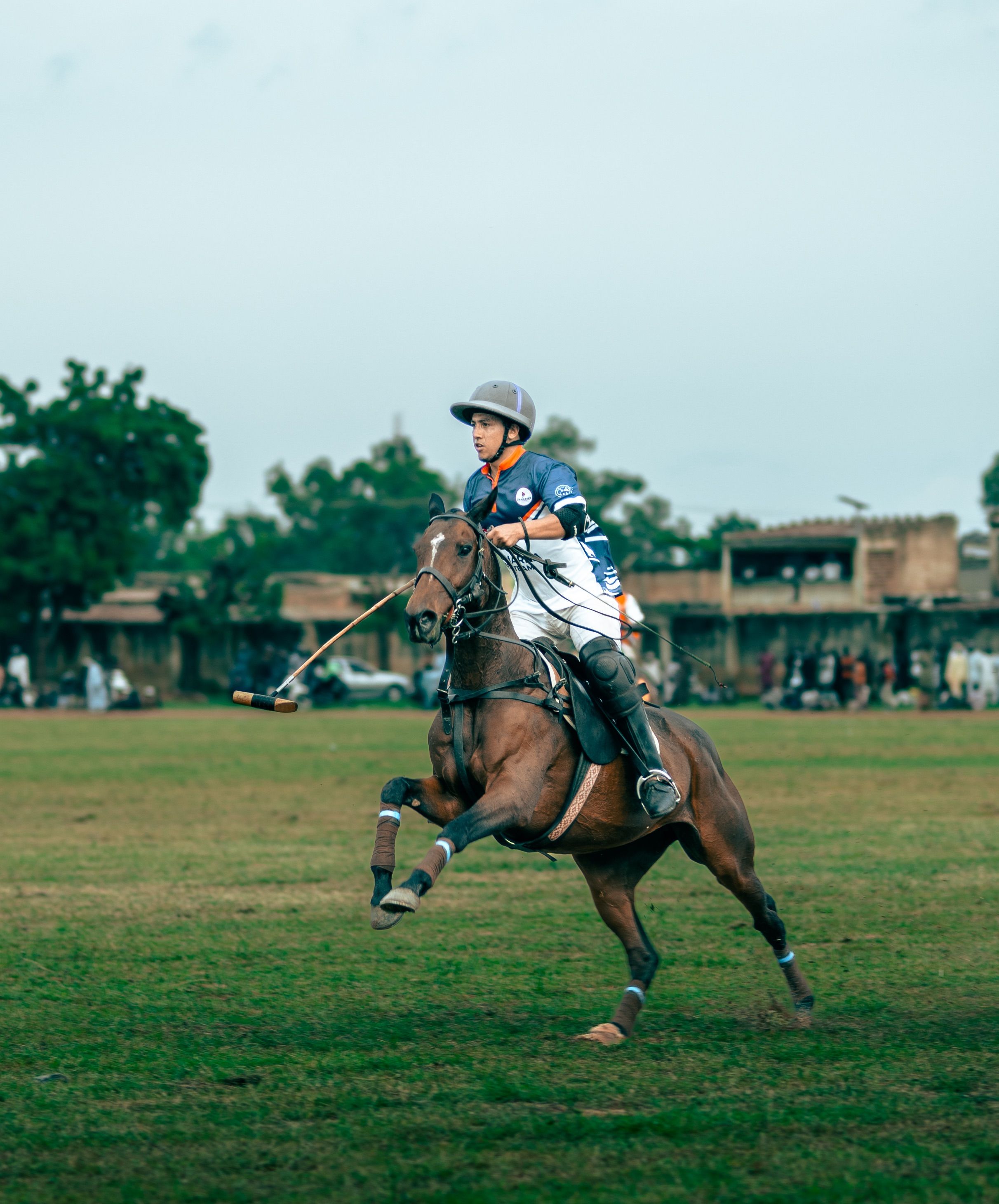 Dynamic Polo Player in Action on Nigerian Field · Free Stock Photo