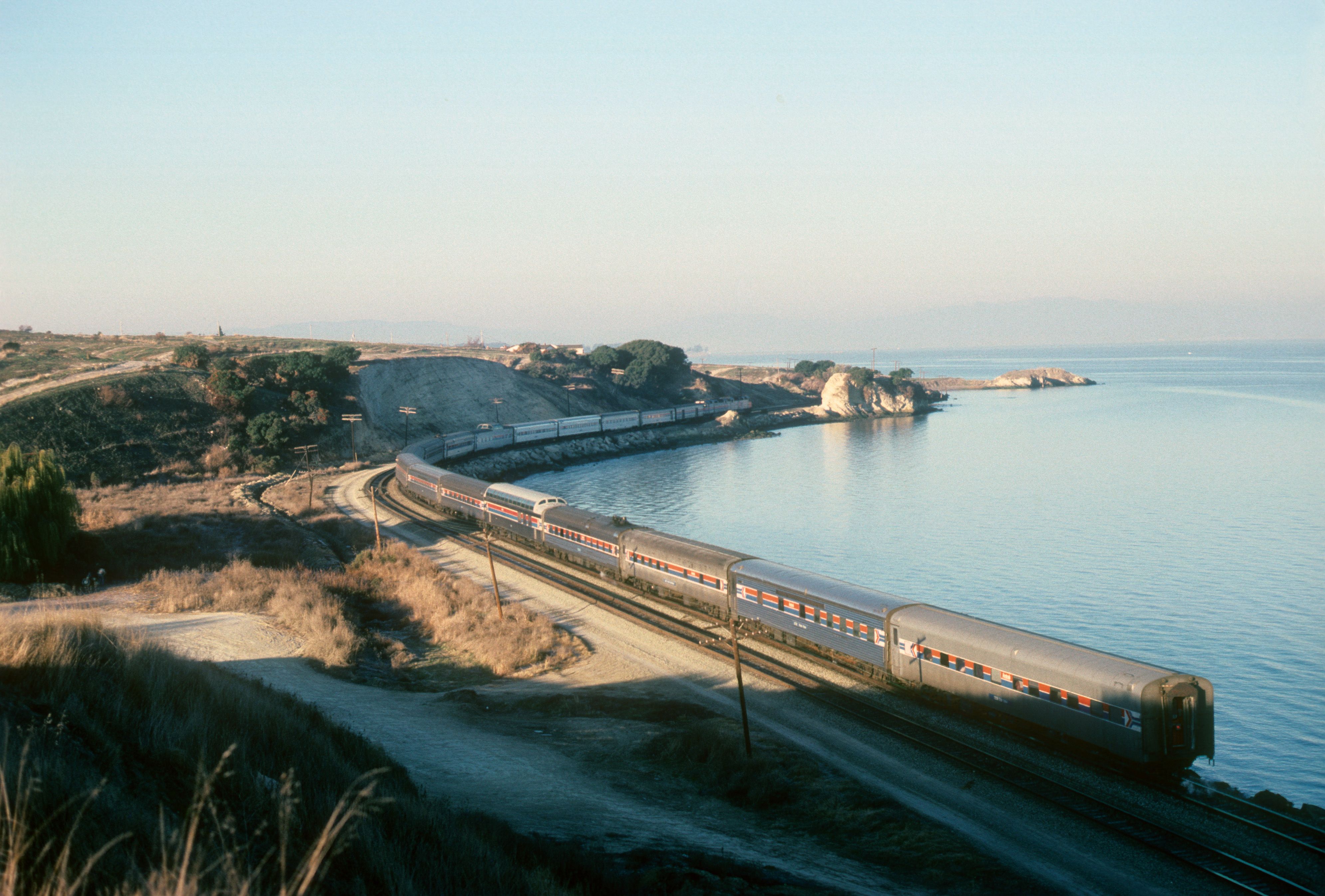 Sunset Train on Western Coastline · Free Stock Photo