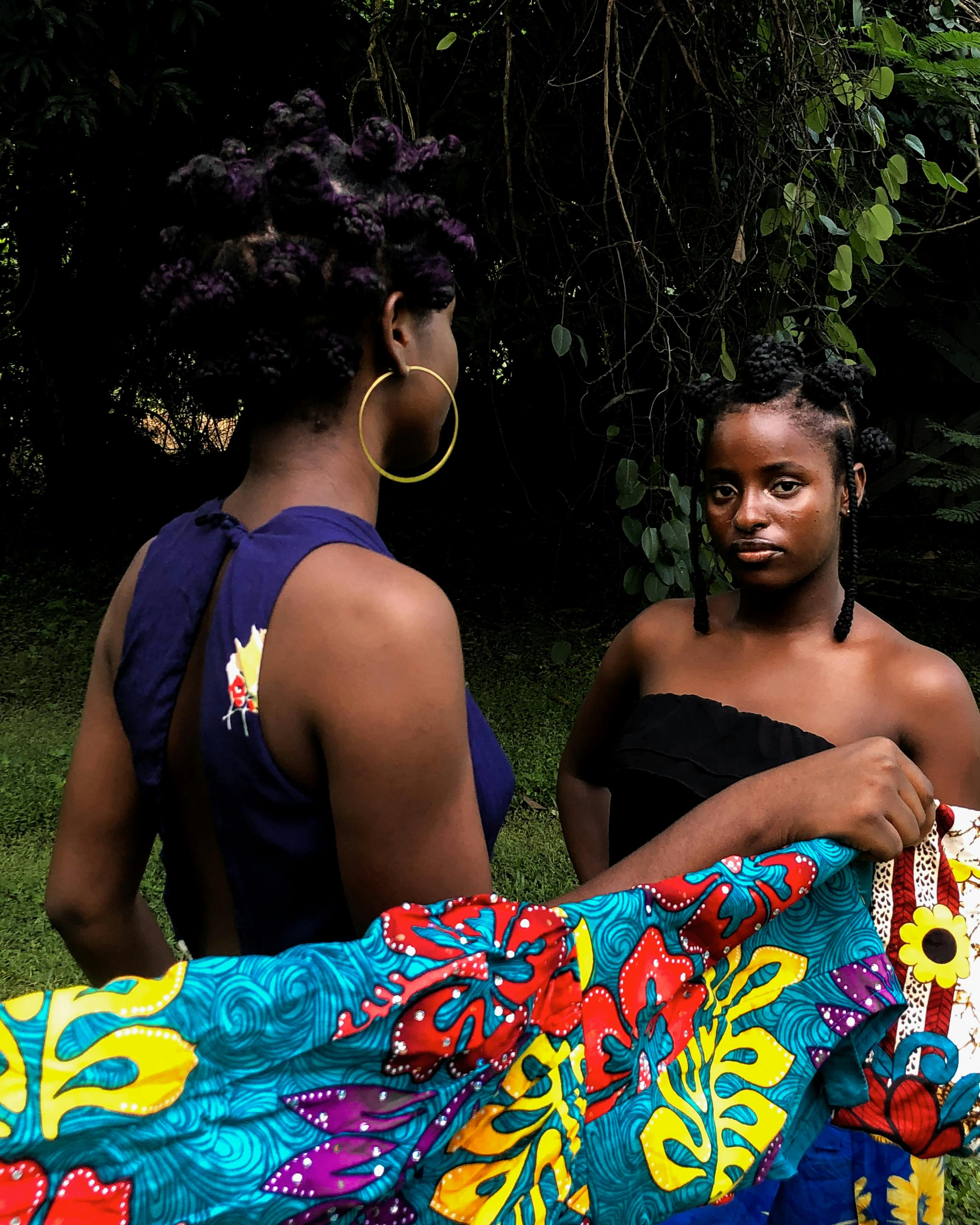 Colorful African Fabric and Fashion Outdoors · Free Stock Photo