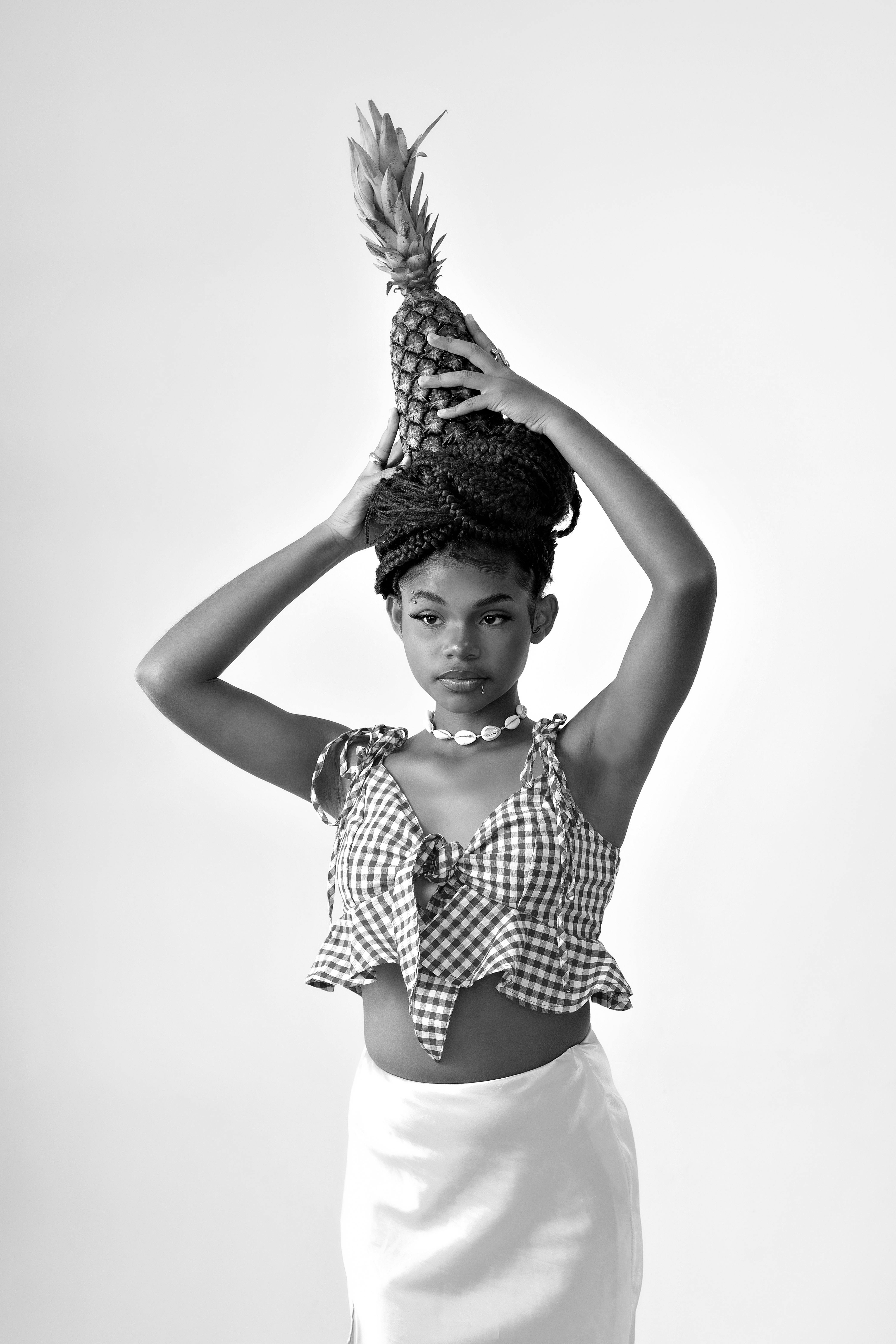 Artistic Portrait of Woman Holding Pineapple · Free Stock Photo