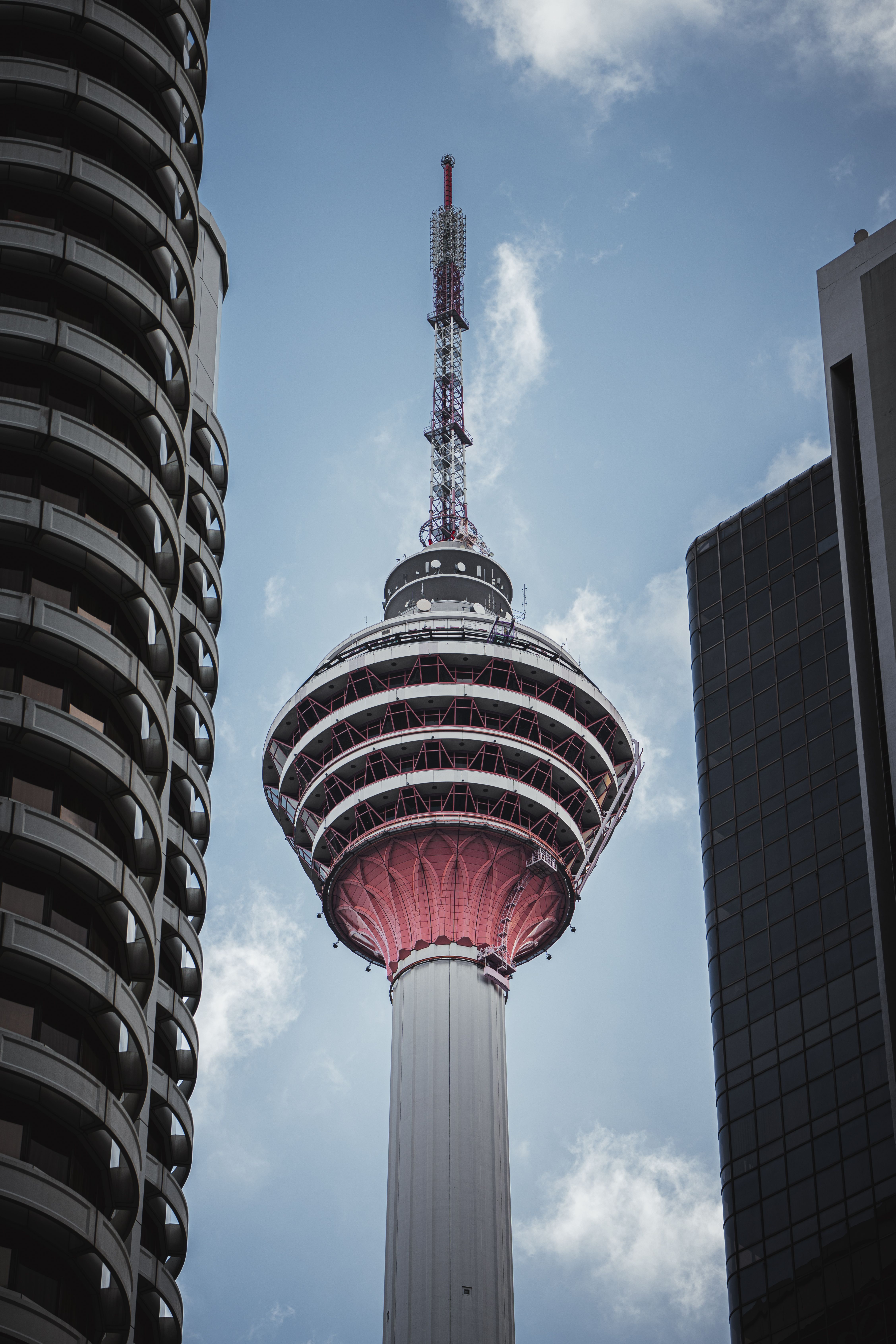 Iconic Menara Kuala Lumpur Tower Against Blue Sky · Free Stock Photo