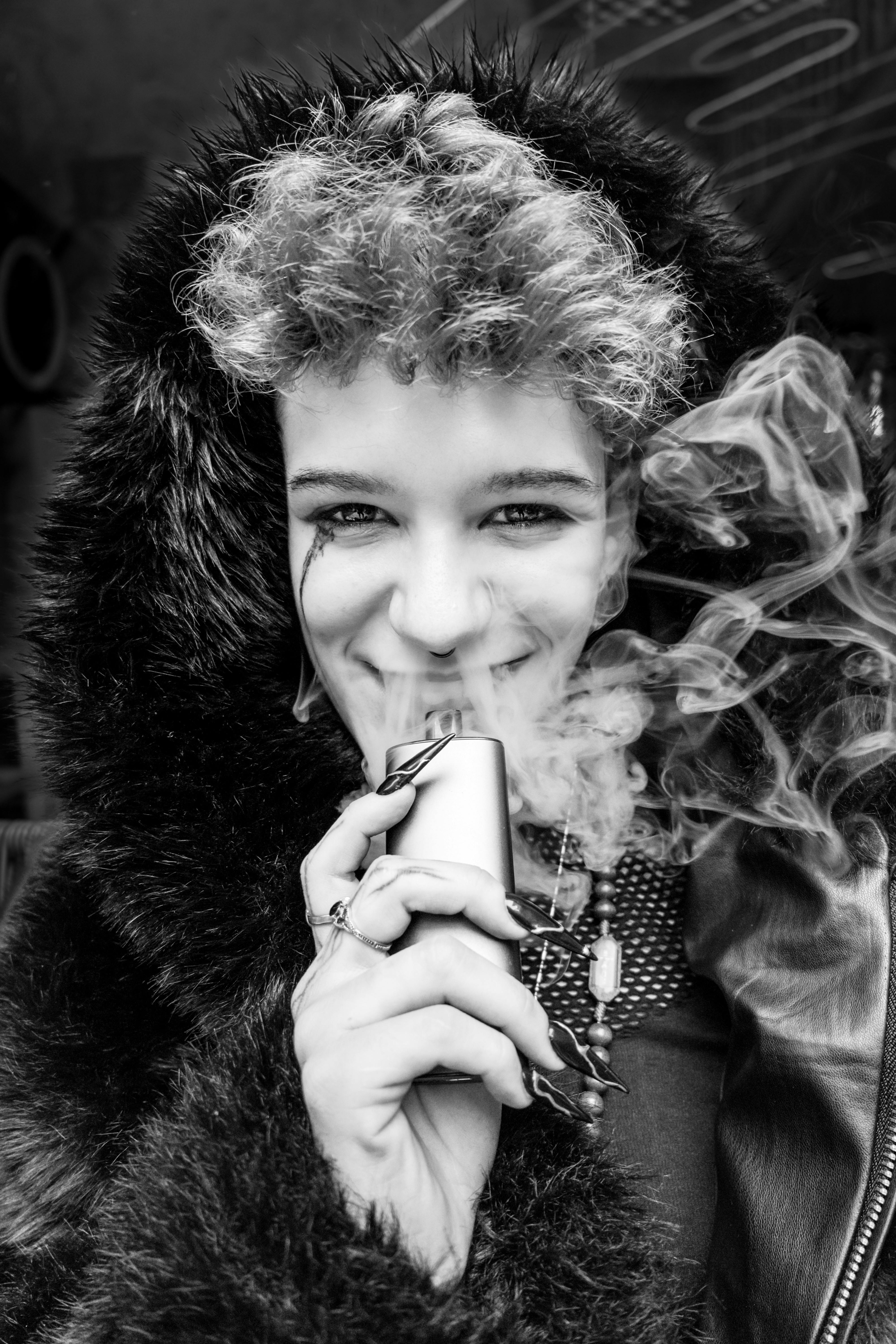 Stylish Youth Vaping in Urban Portrait · Free Stock Photo