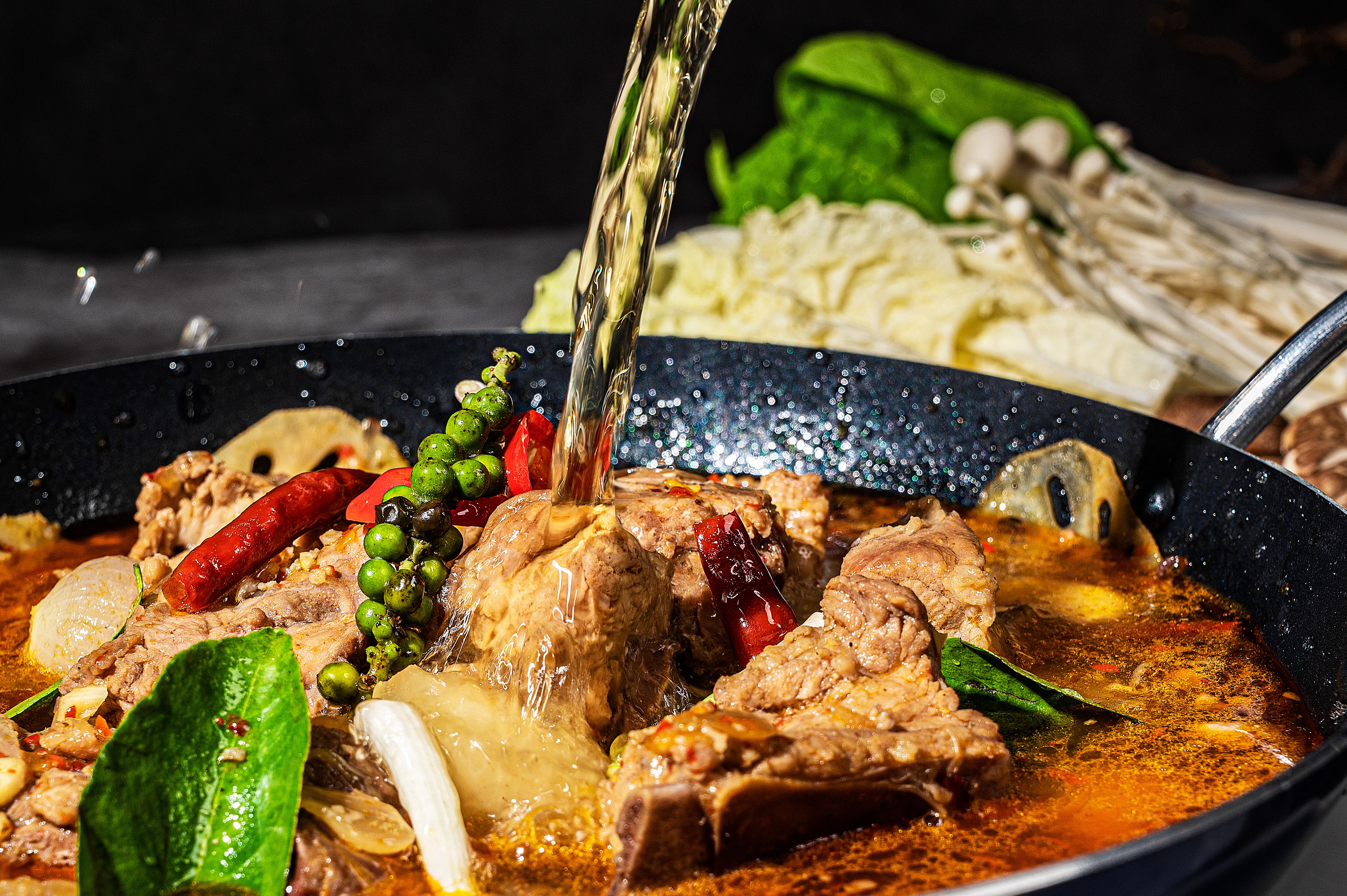 Delicious Spicy Hot Pot with Fresh Ingredients · Free Stock Photo