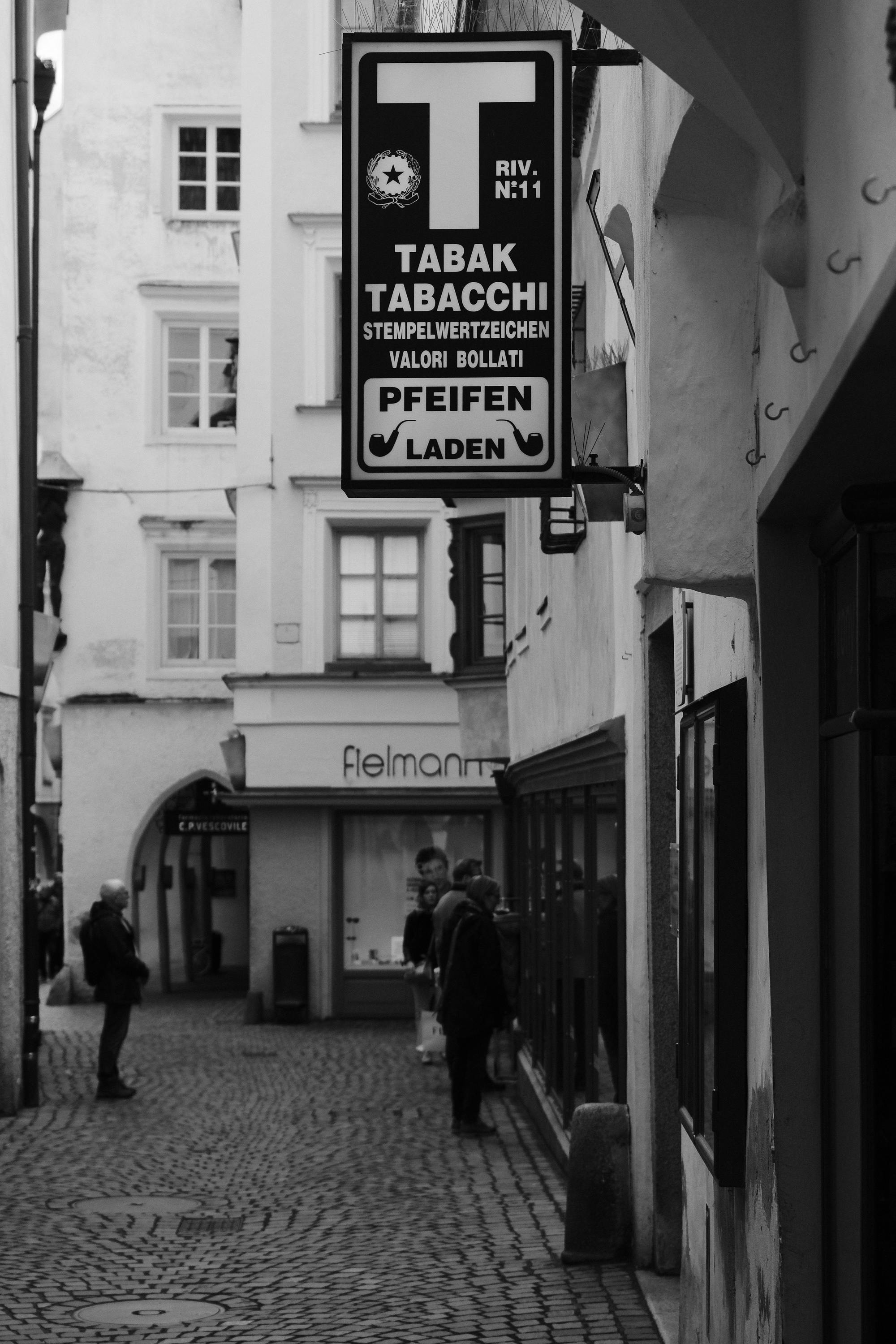 Historic European Street with Tabak Shop Sign · Free Stock Photo