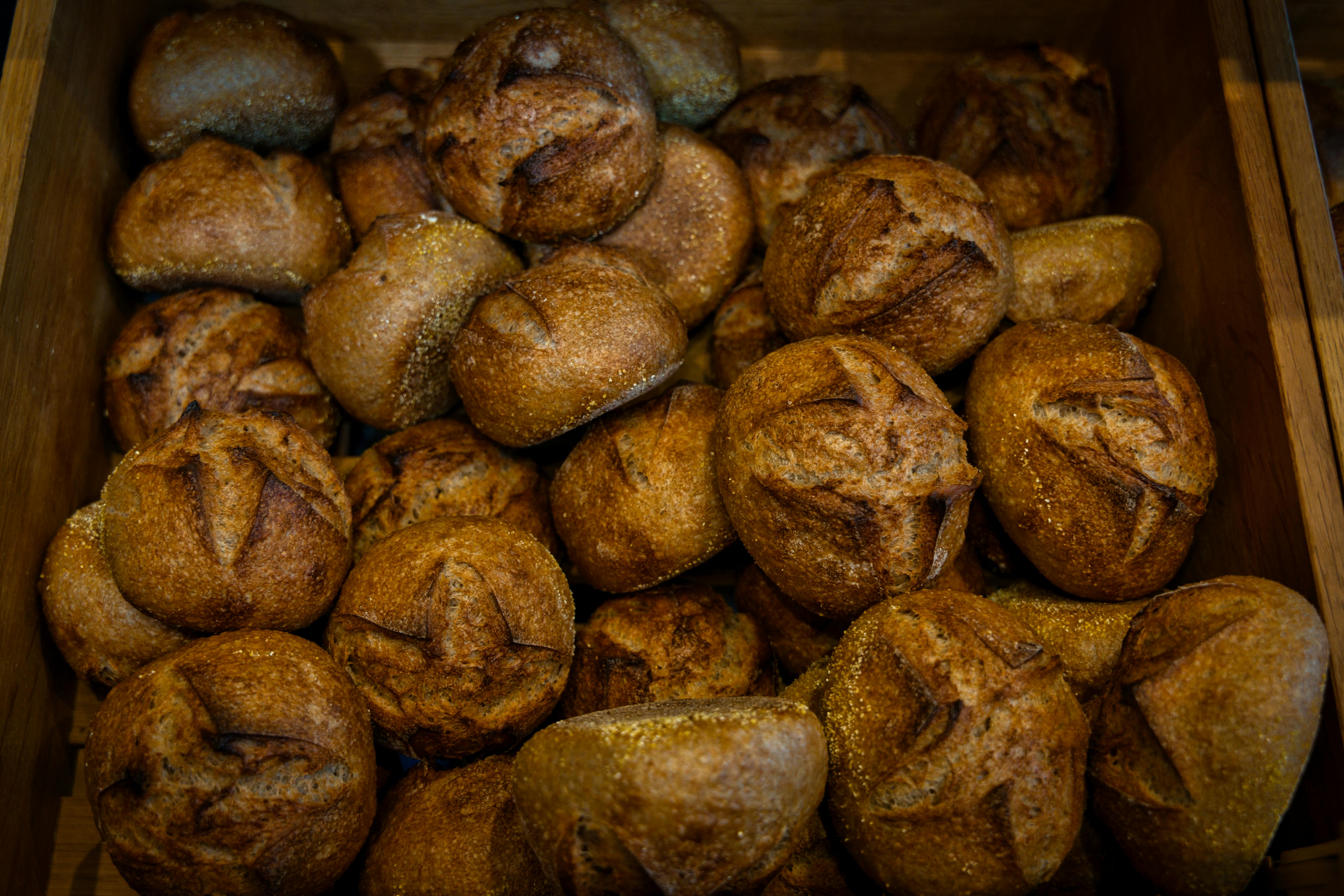 Freshly Baked Artisan Bread Rolls in Berlin Bakery · Free Stock Photo