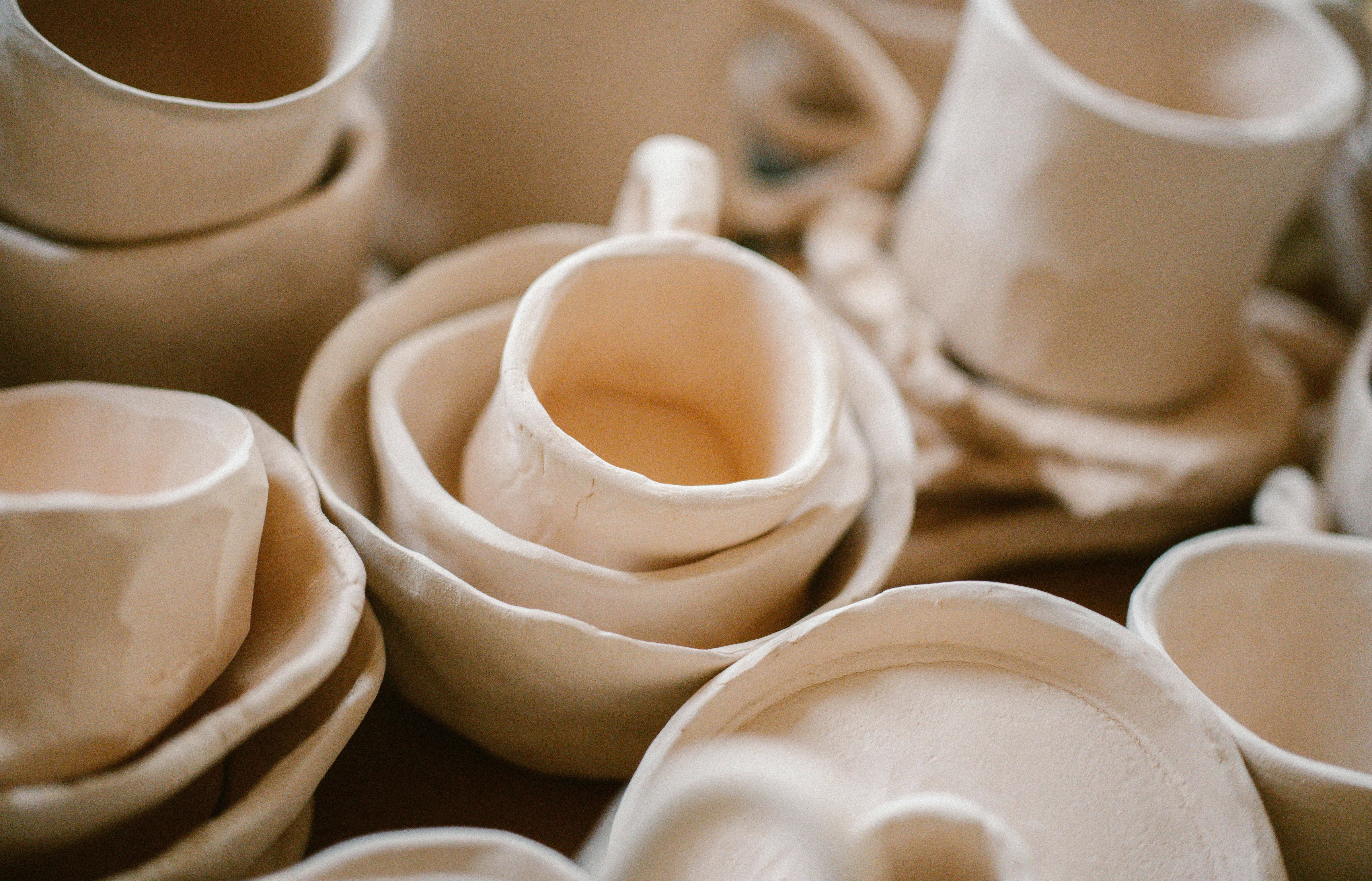 Artisanal Clay Pottery Collection Close-Up · Free Stock Photo