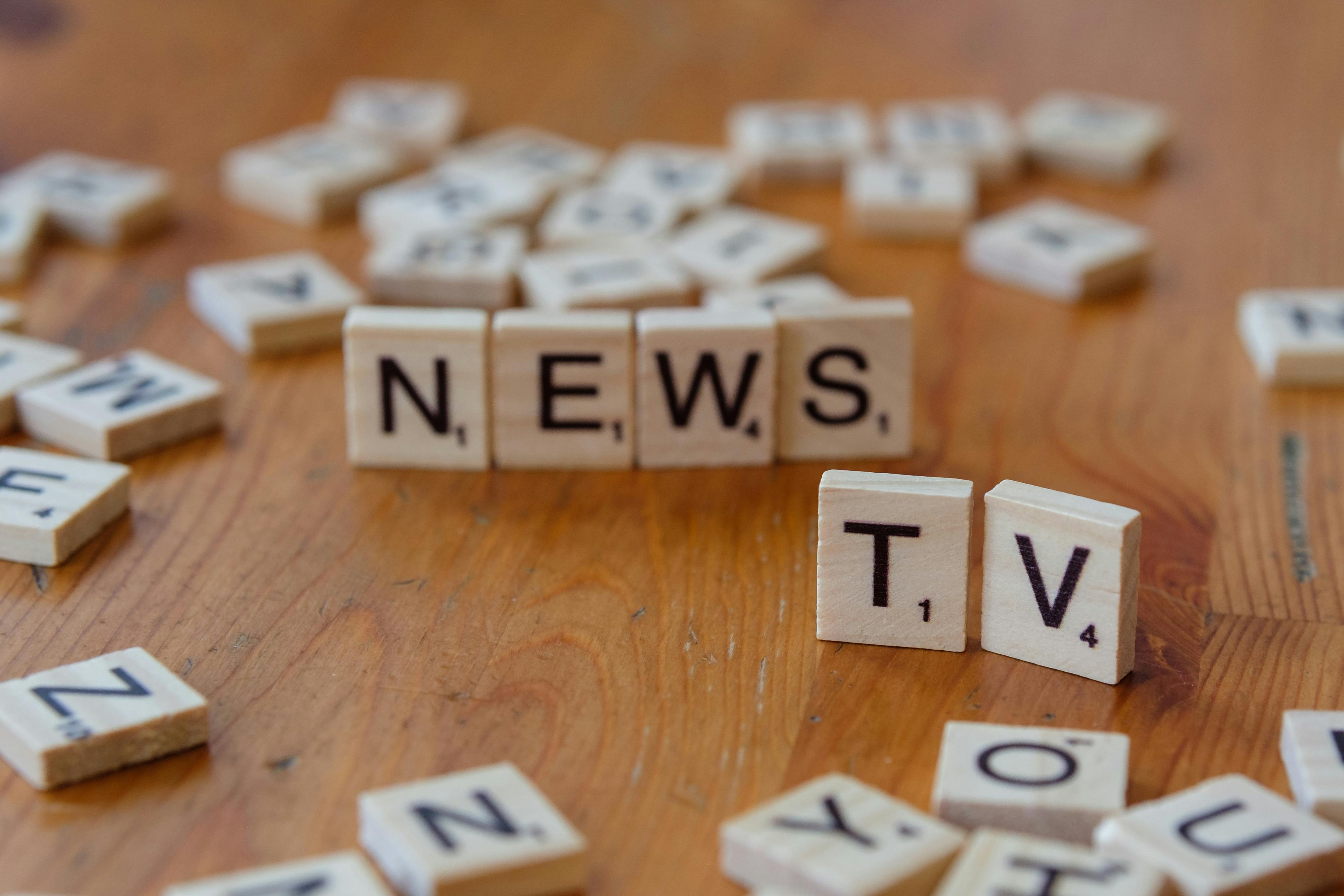 Scrabble Tiles Forming Words News and TV · Free Stock Photo