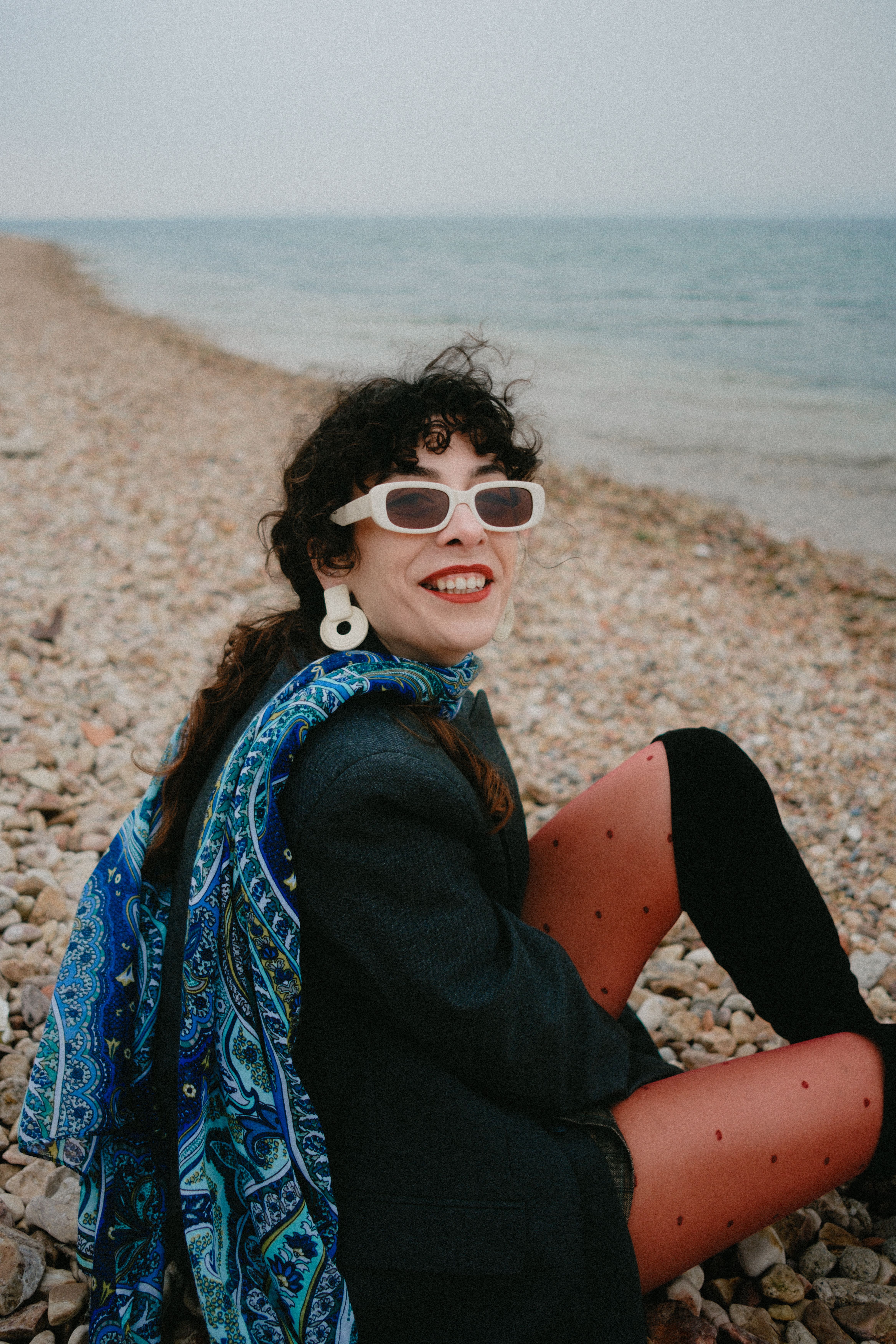 Fashionable Woman Enjoying Beach in Chic Outfit · Free Stock Photo