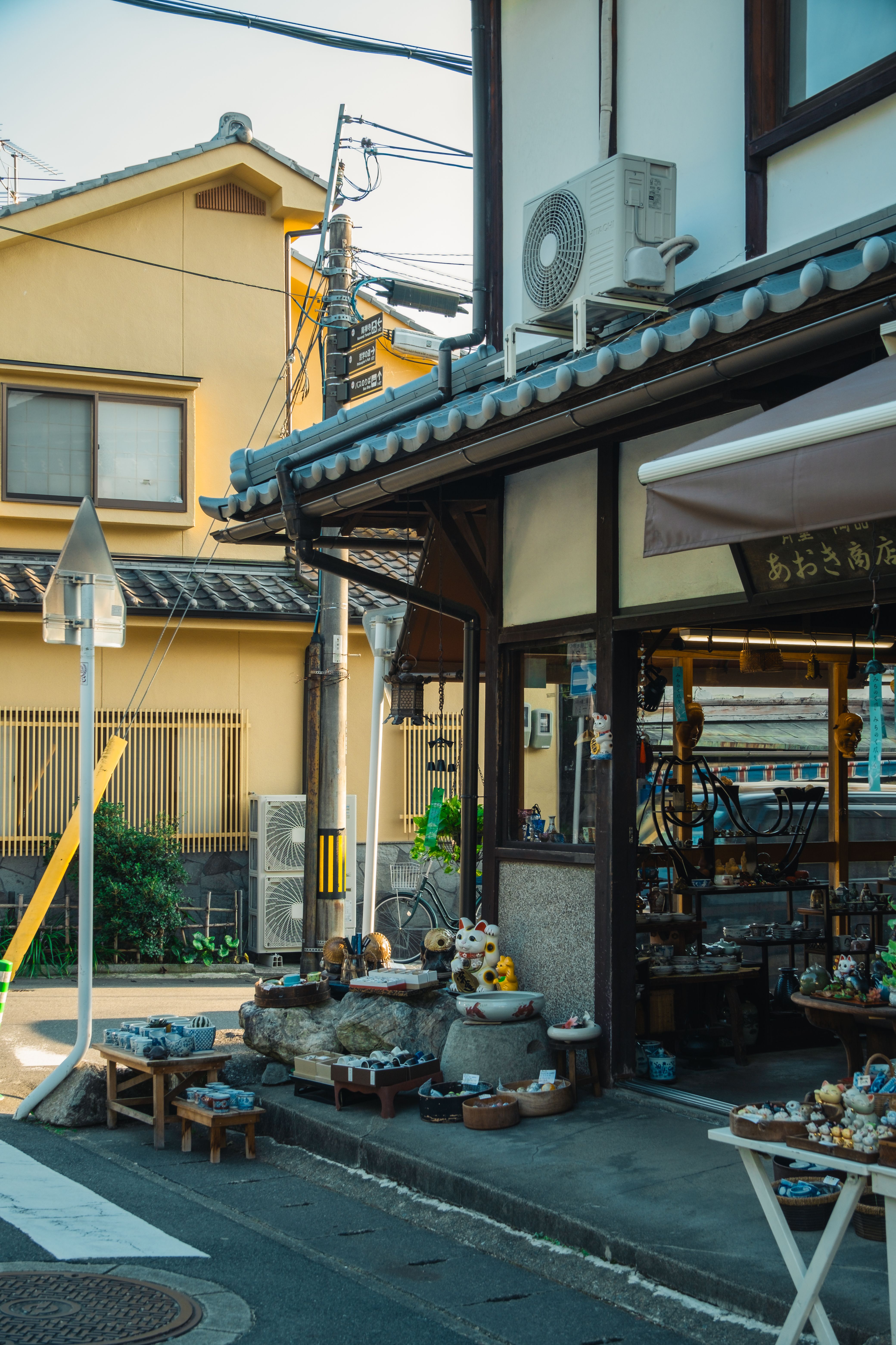 Charming Japanese Street with Pottery Display · Free Stock Photo