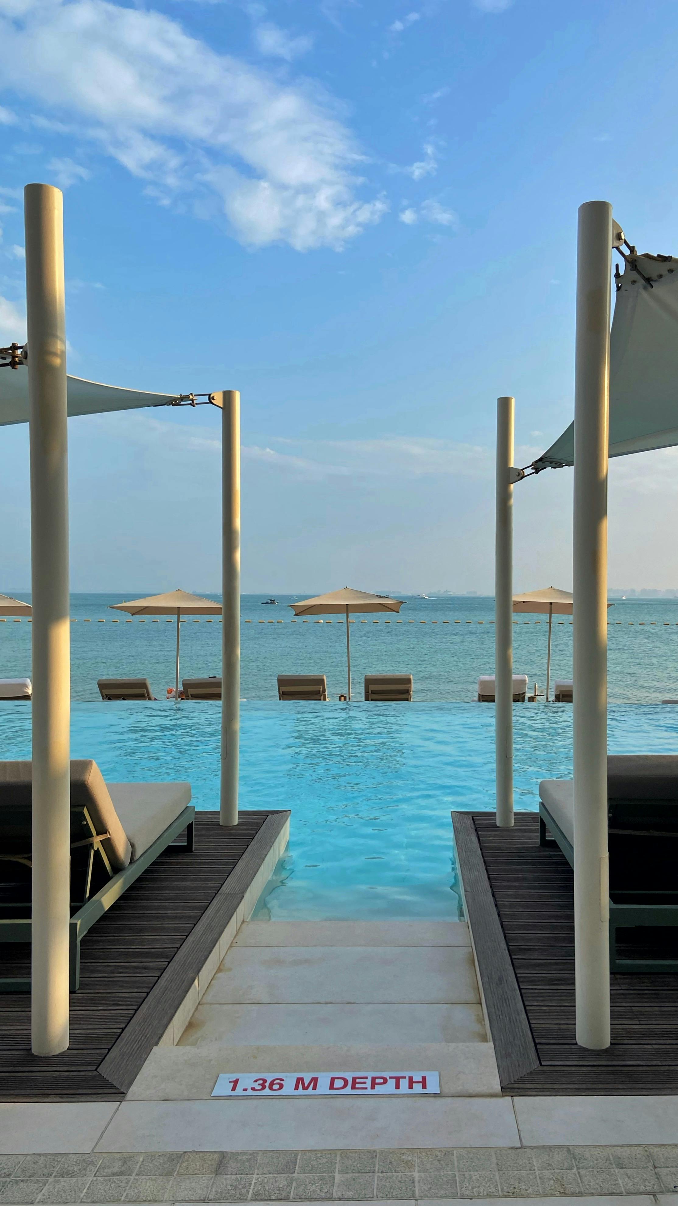 Luxurious Infinity Pool Overlooking the Sea · Free Stock Photo