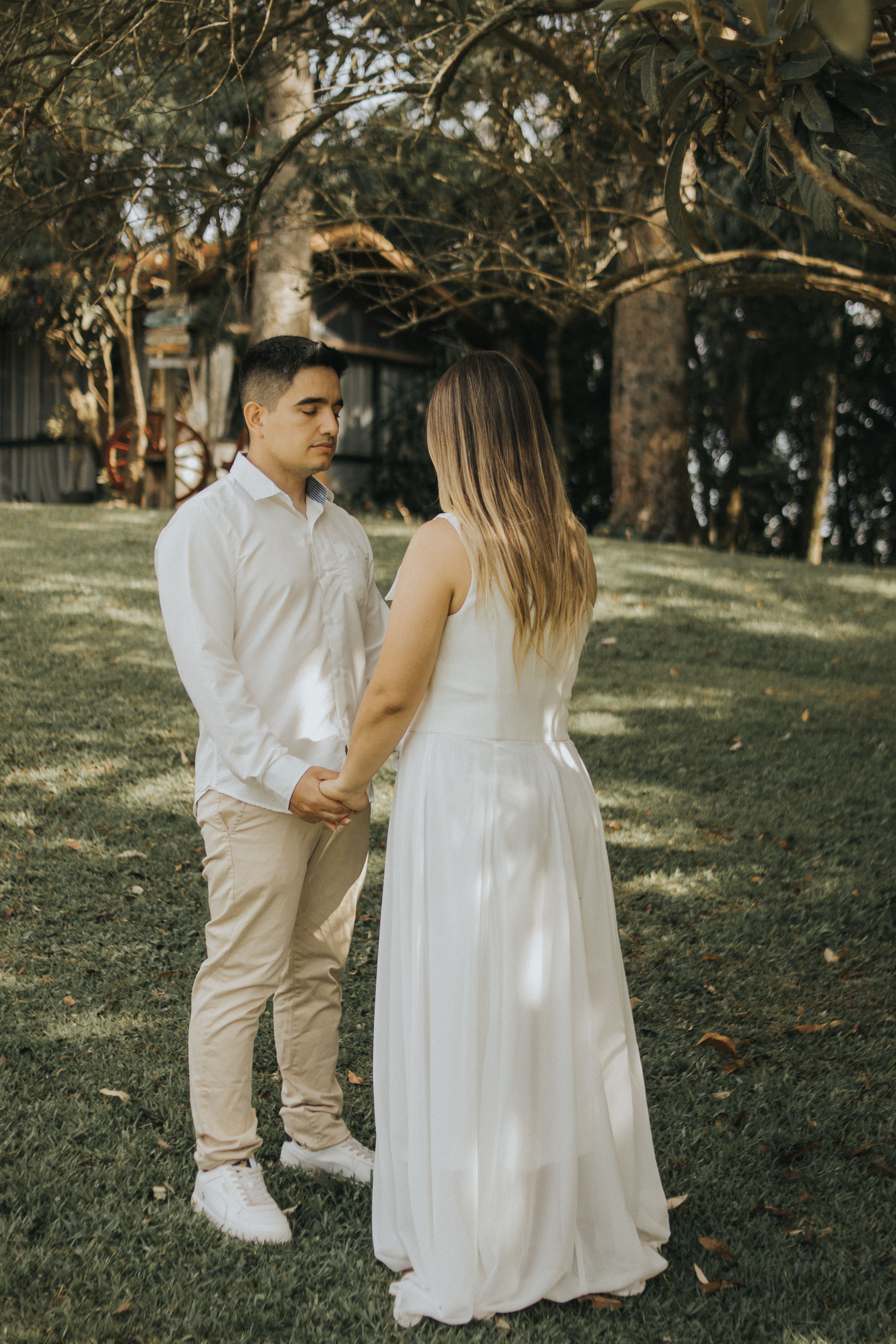 Romantic Couple Holding Hands Outdoors · Free Stock Photo