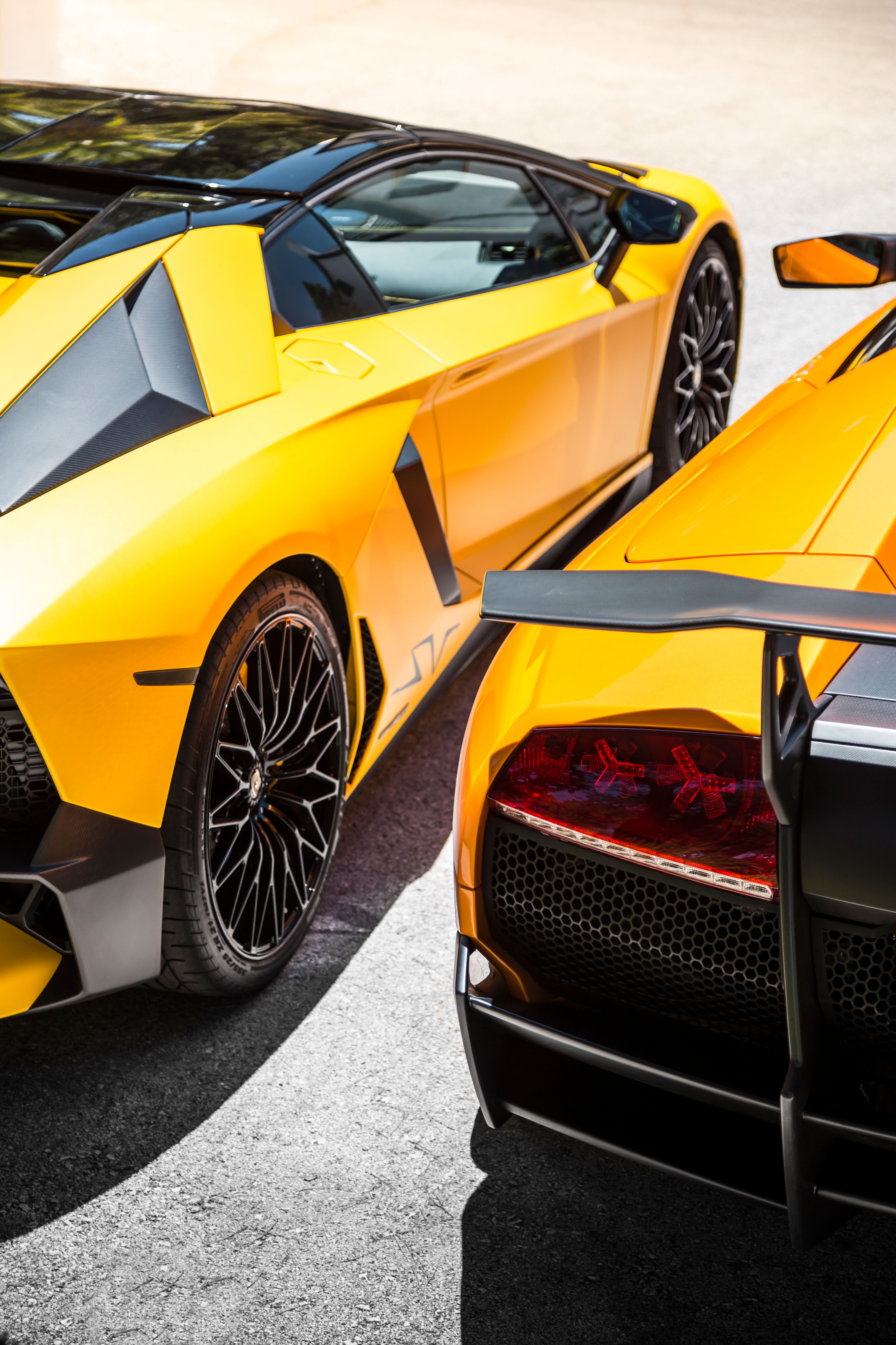 Vibrant Yellow Sports Cars in the Sun · Free Stock Photo