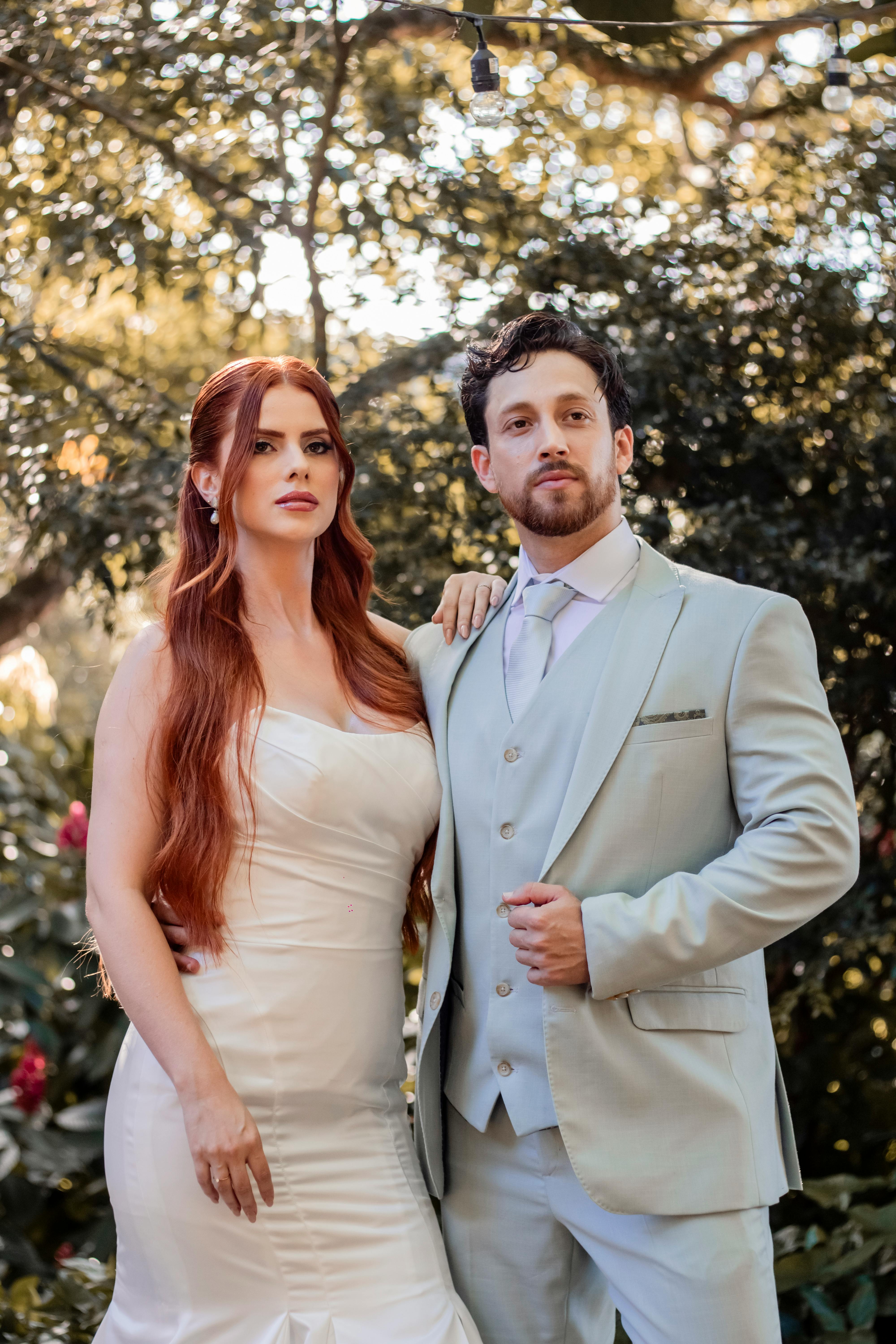 Elegant Outdoor Wedding Portrait of Couple Posing · Free Stock Photo