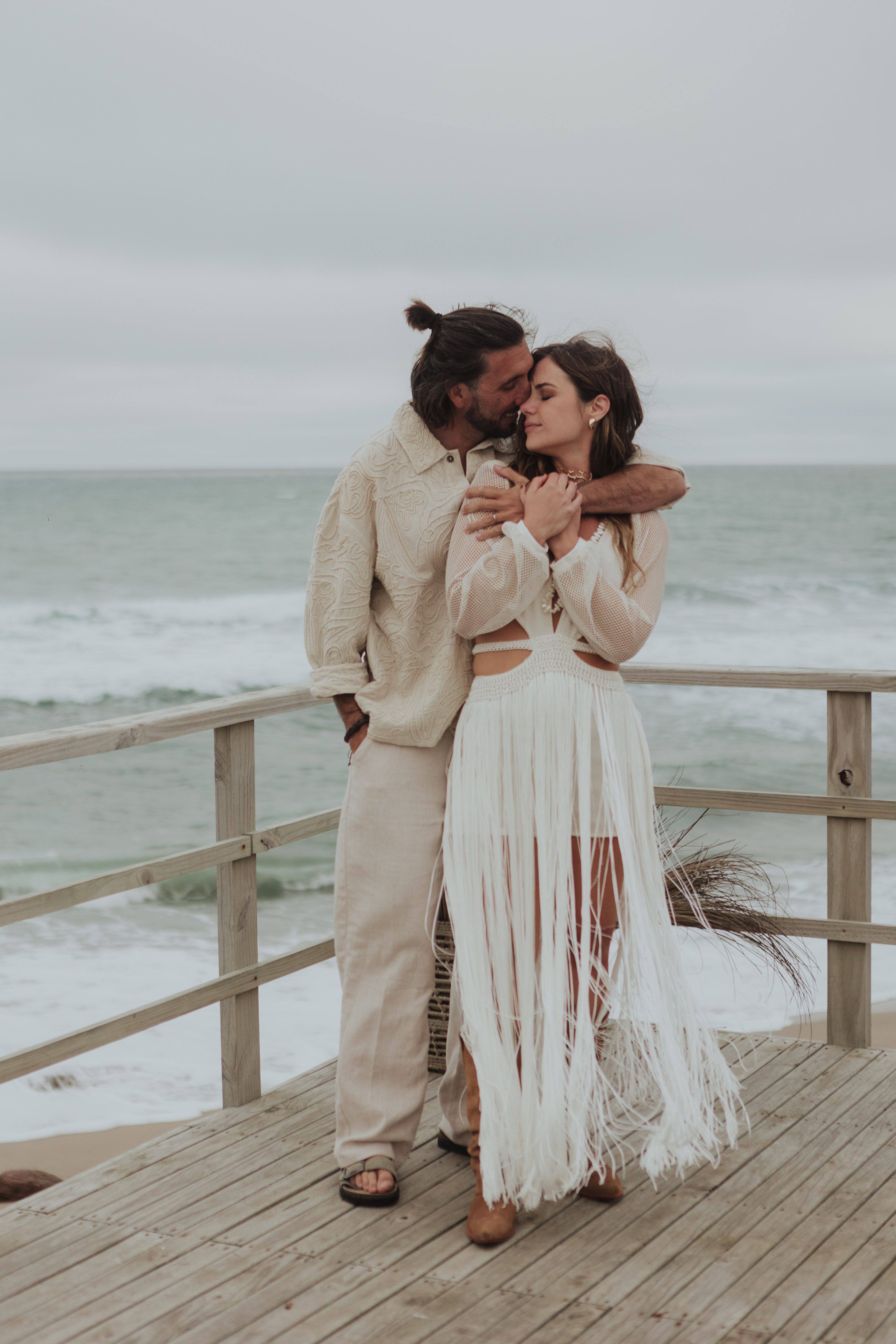 Romantic Couple Enjoying Beachfront Scenery · Free Stock Photo