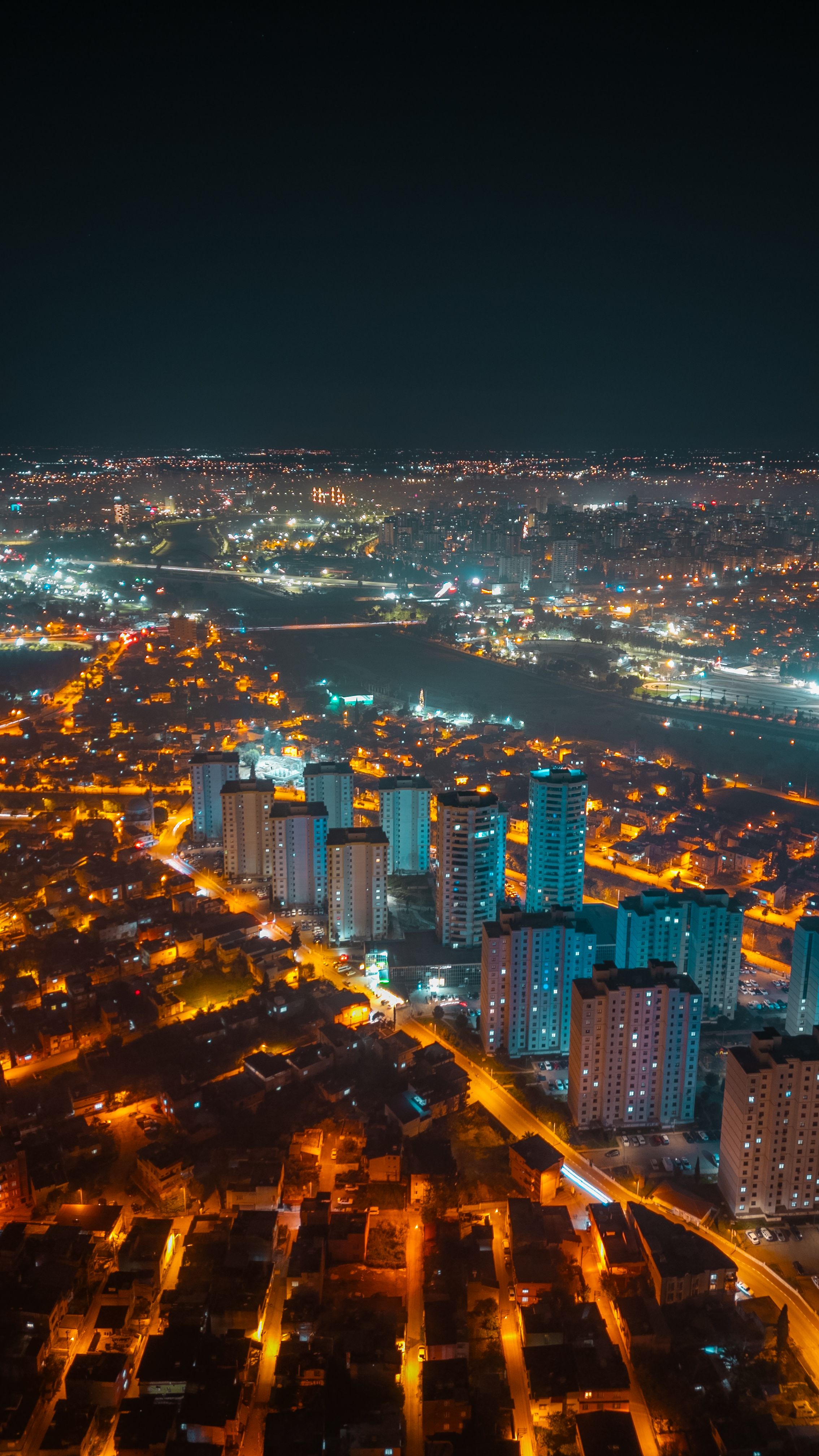 Aerial Night View of Illuminated Cityscape · Free Stock Photo