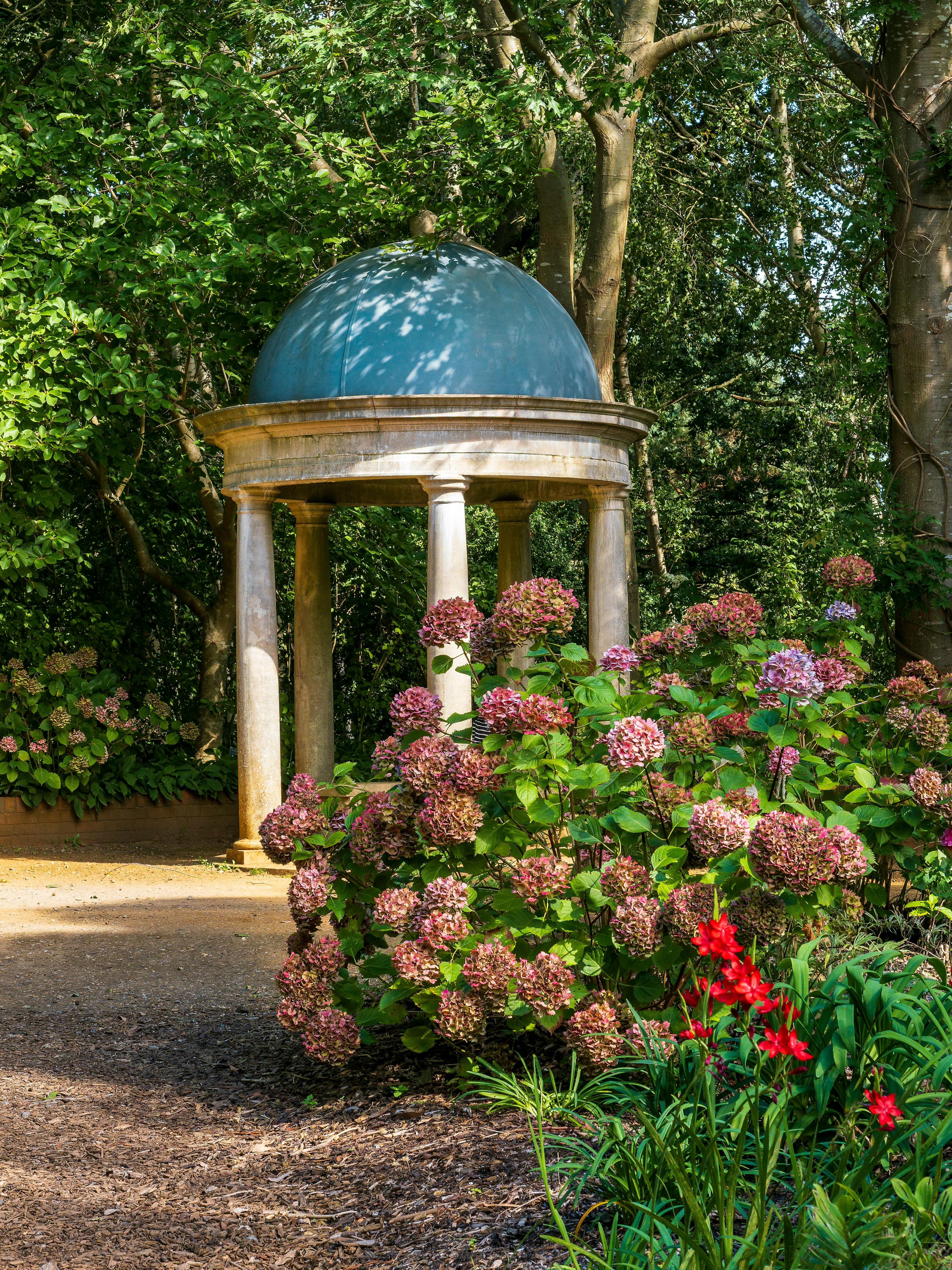 Charming English Garden with Rustic Folly · Free Stock Photo