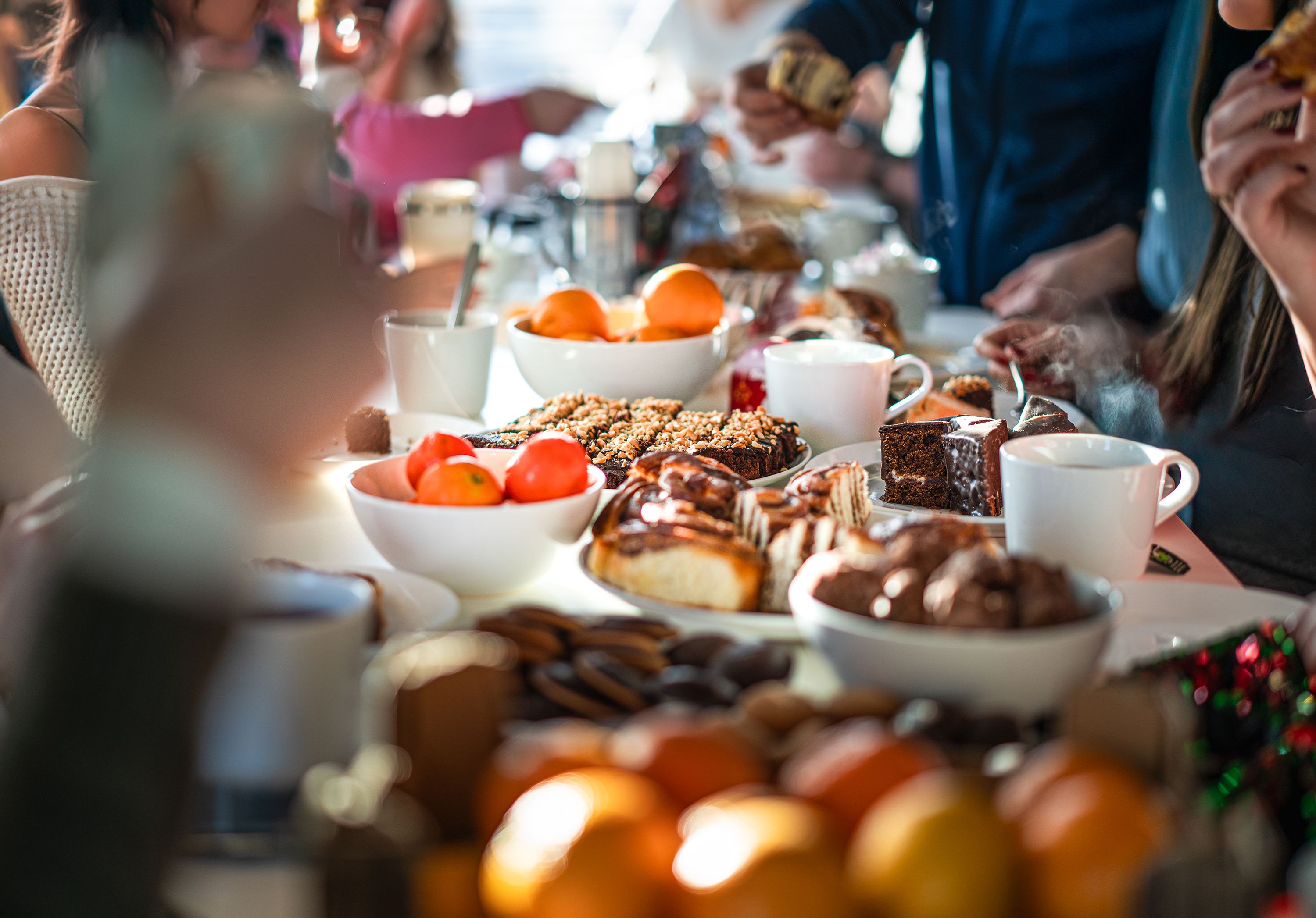 Casual Office Gathering With Breakfast Treats · Free Stock Photo