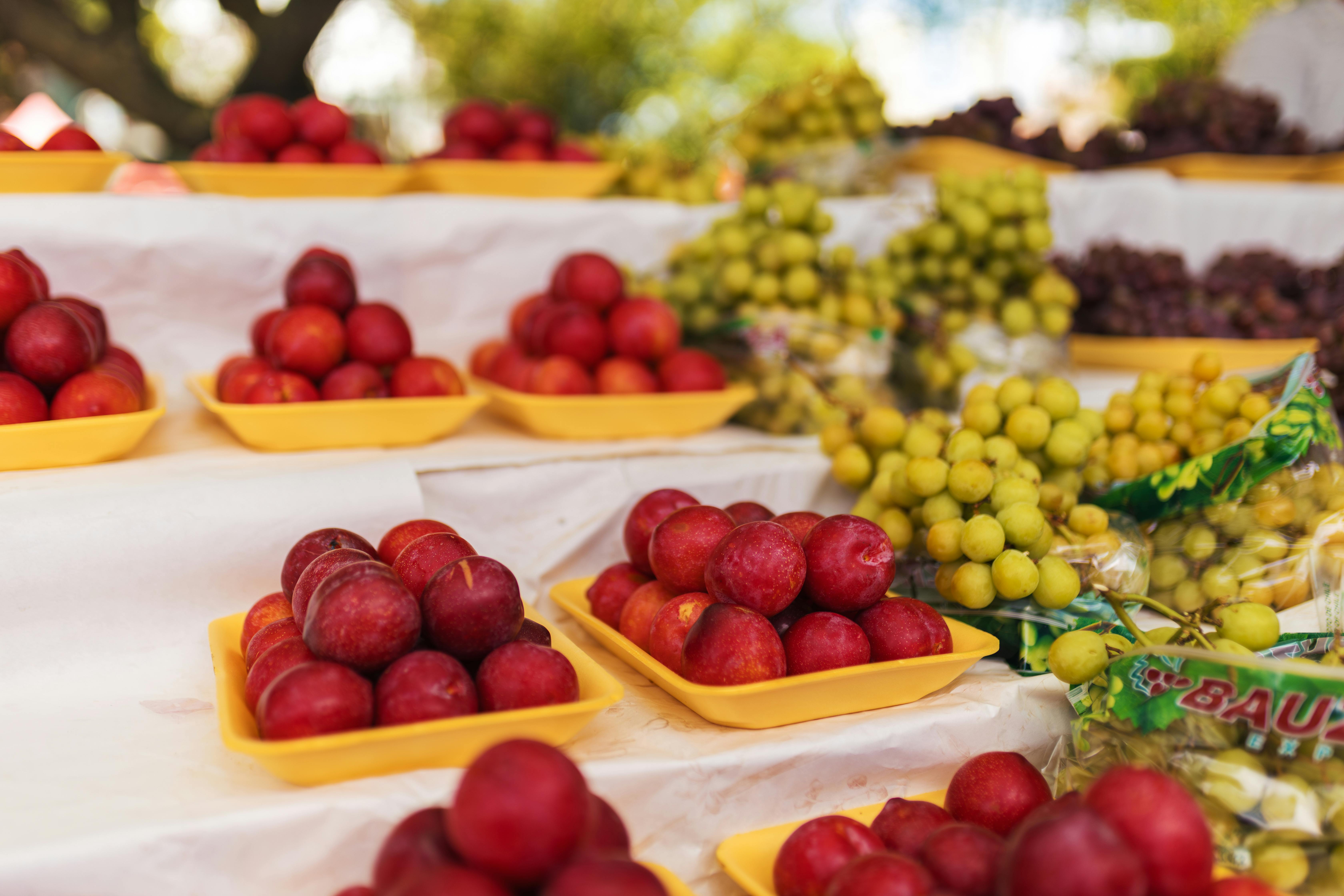 Colorful Fruit Display at Outdoor Market · Free Stock Photo