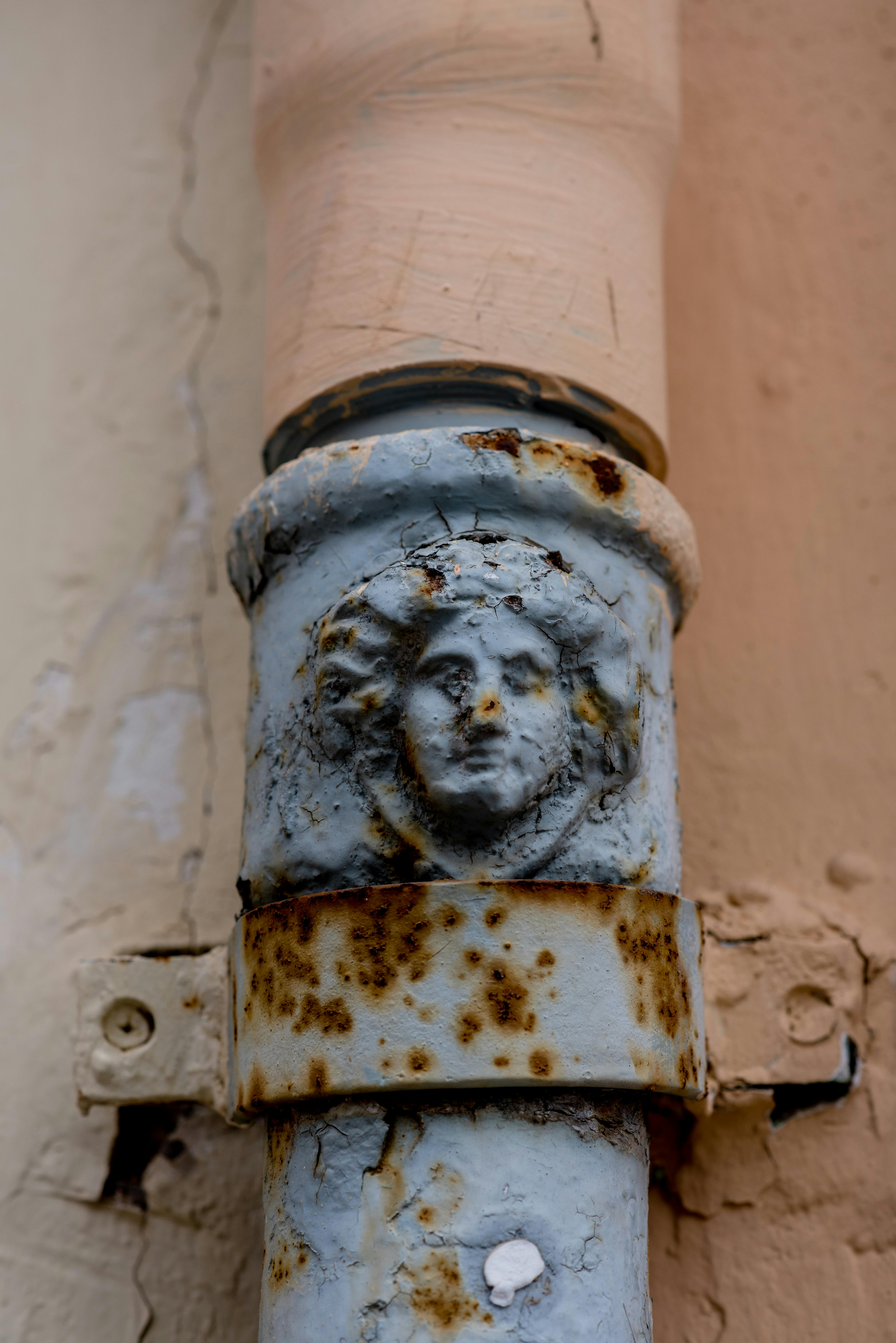 Rustic Pipe with Intricate Face Carving · Free Stock Photo