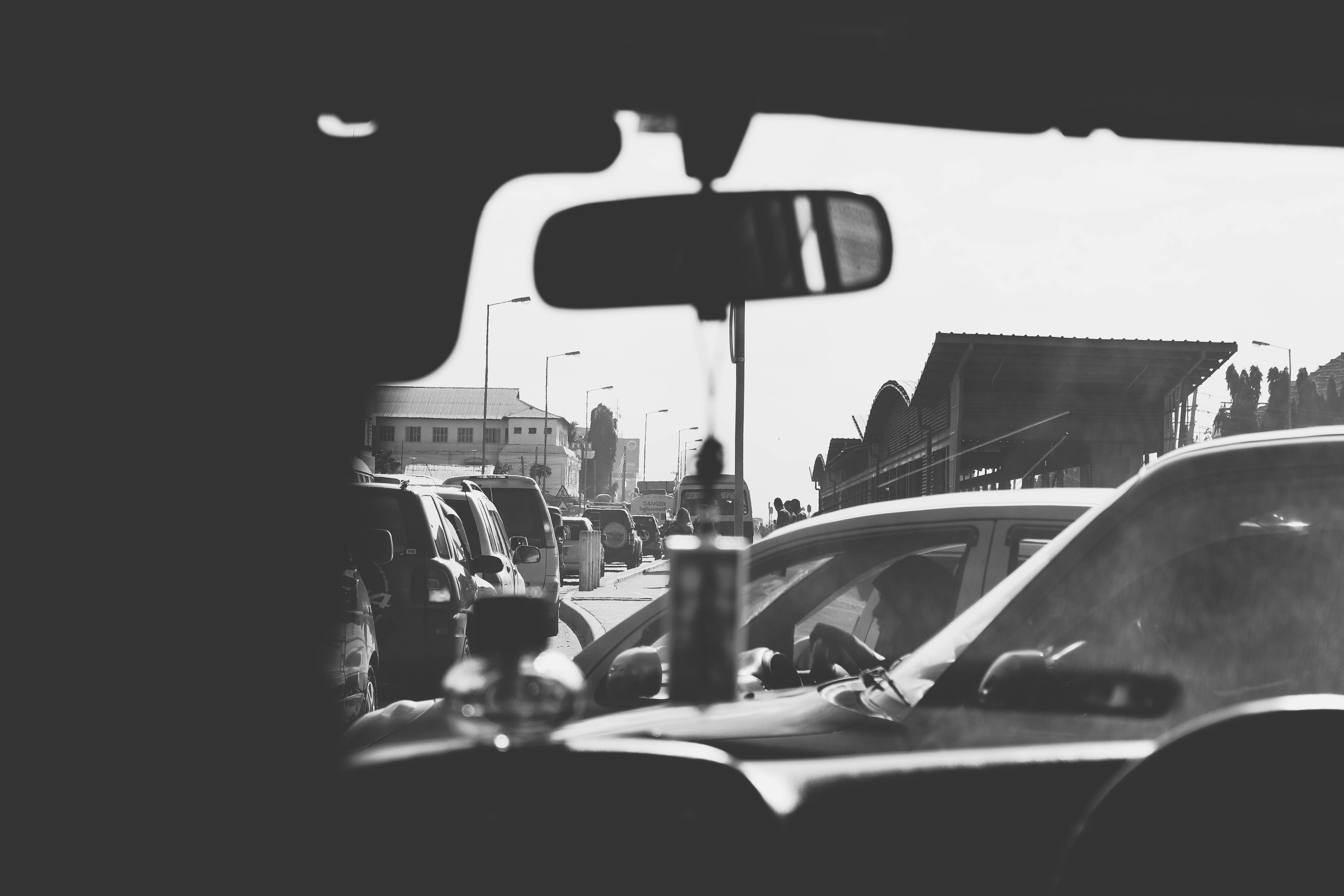 Monochrome Urban Traffic Jam through Car Window · Free Stock Photo