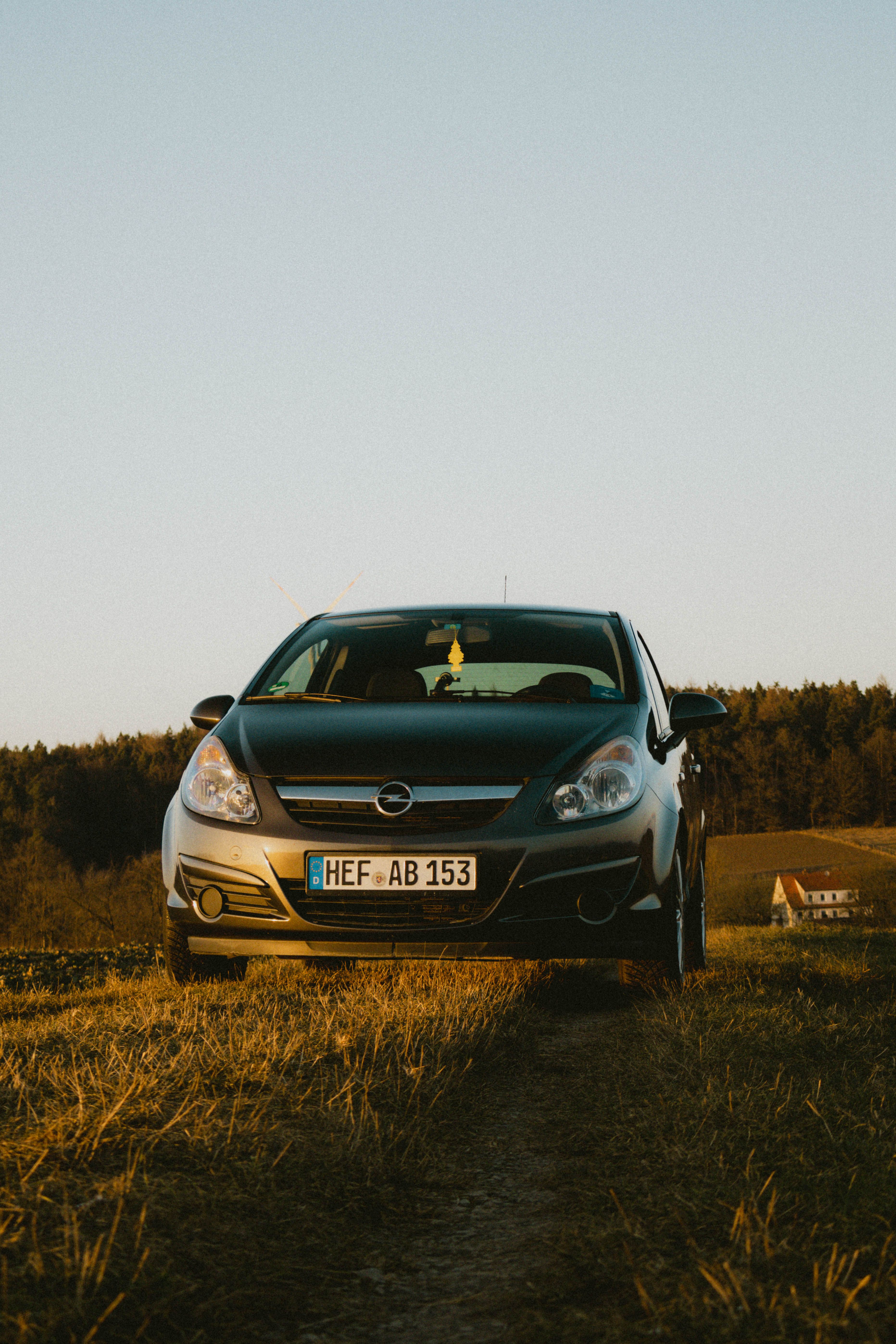 Car on Rural Road at Sunset in Bad Hersfeld · Free Stock Photo